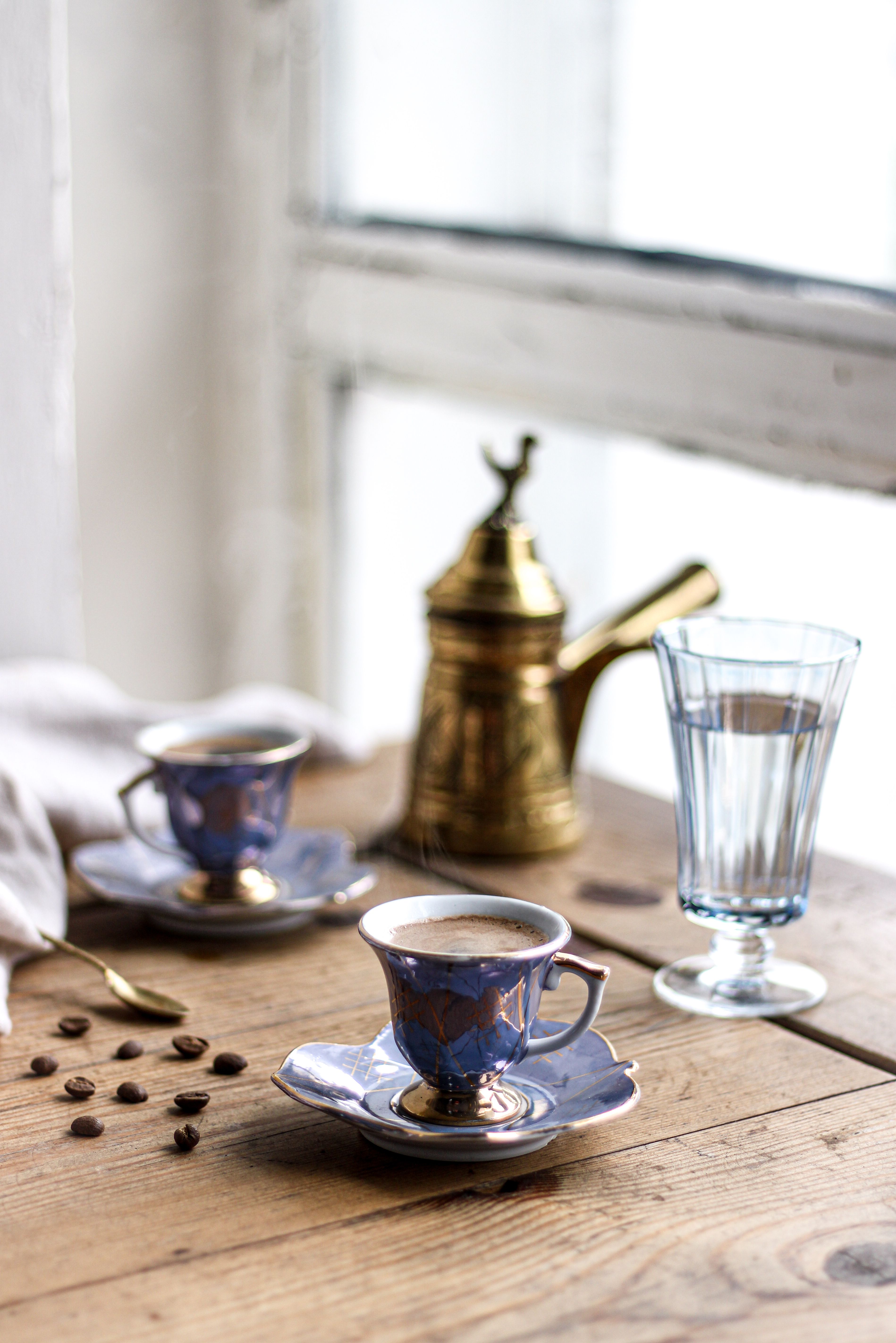 Blue Cup of Coffee Set on Plate · Free Stock Photo