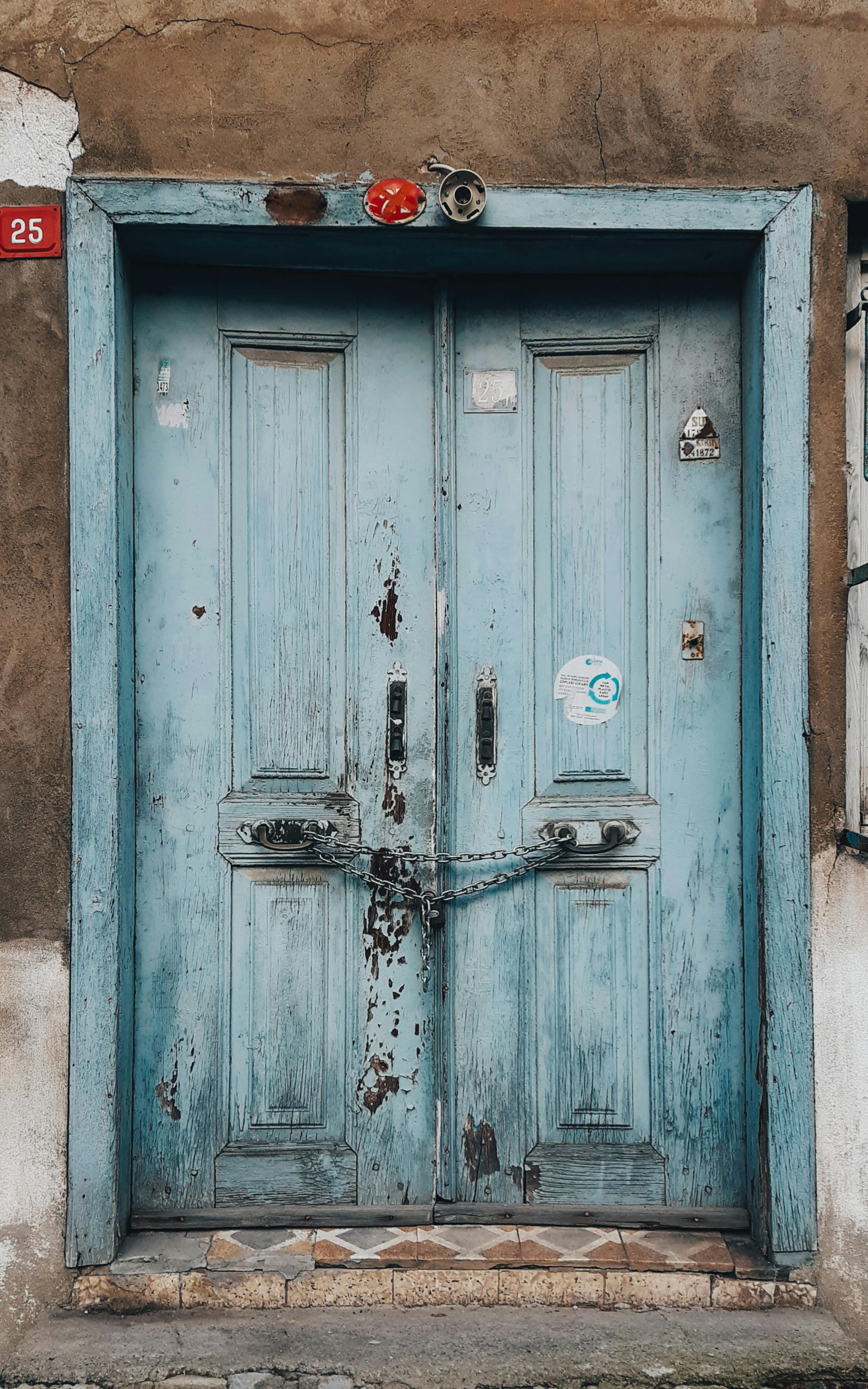 A Brown Wooden Door Propped Open · Free Stock Photo