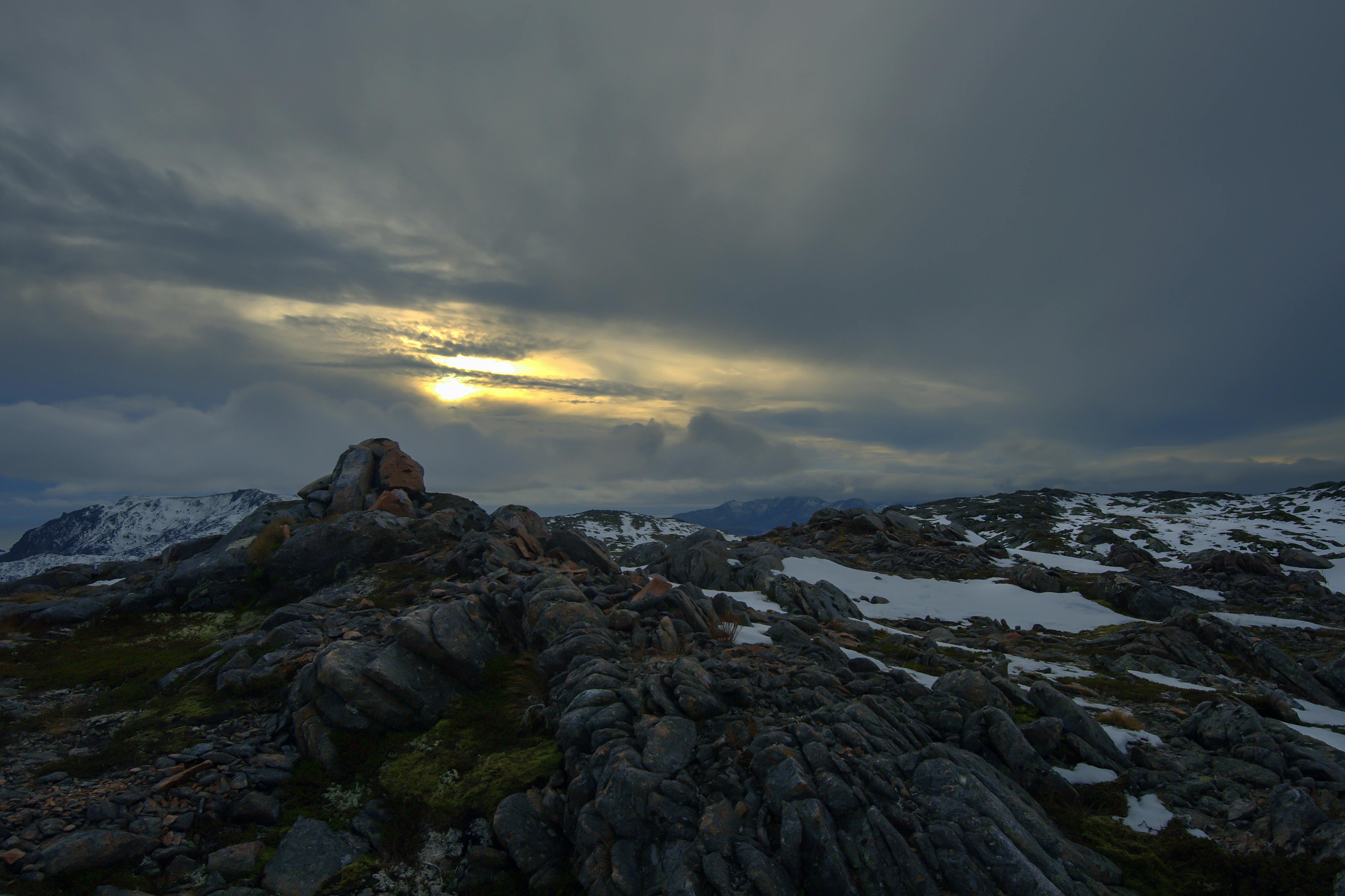 Clouds over Rocks in Snow · Free Stock Photo