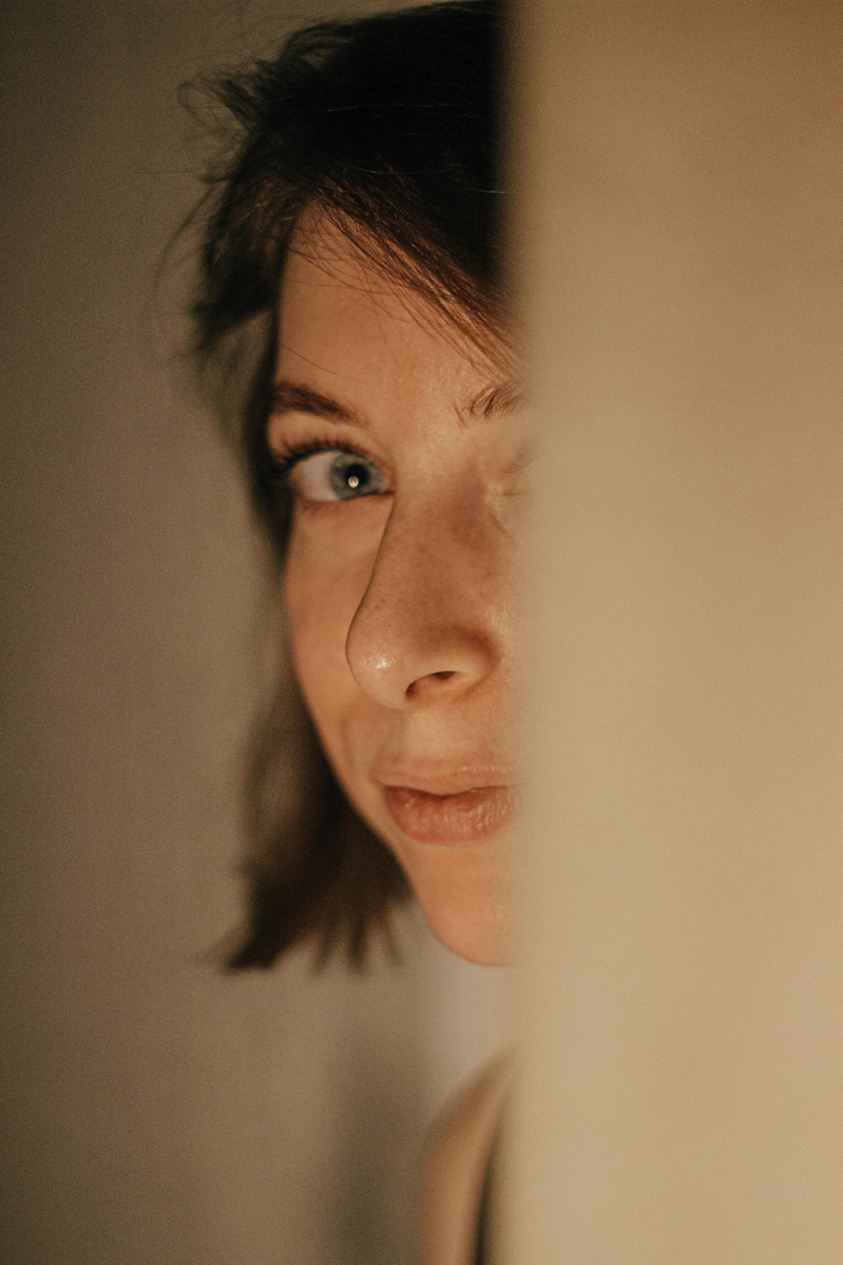 Close-Up Shot of a Woman Smiling · Free Stock Photo
