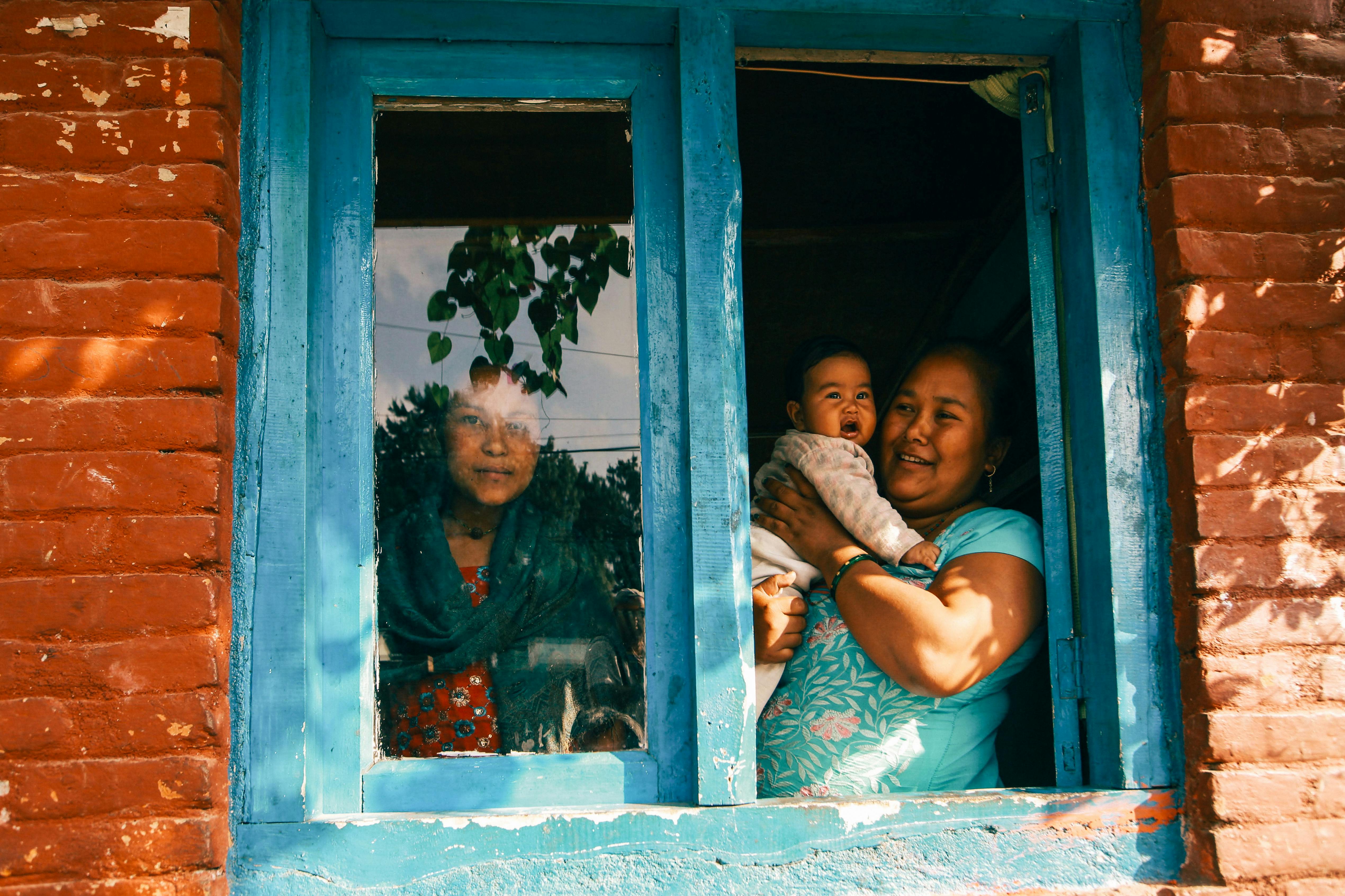 People Looking Out the Window · Free Stock Photo
