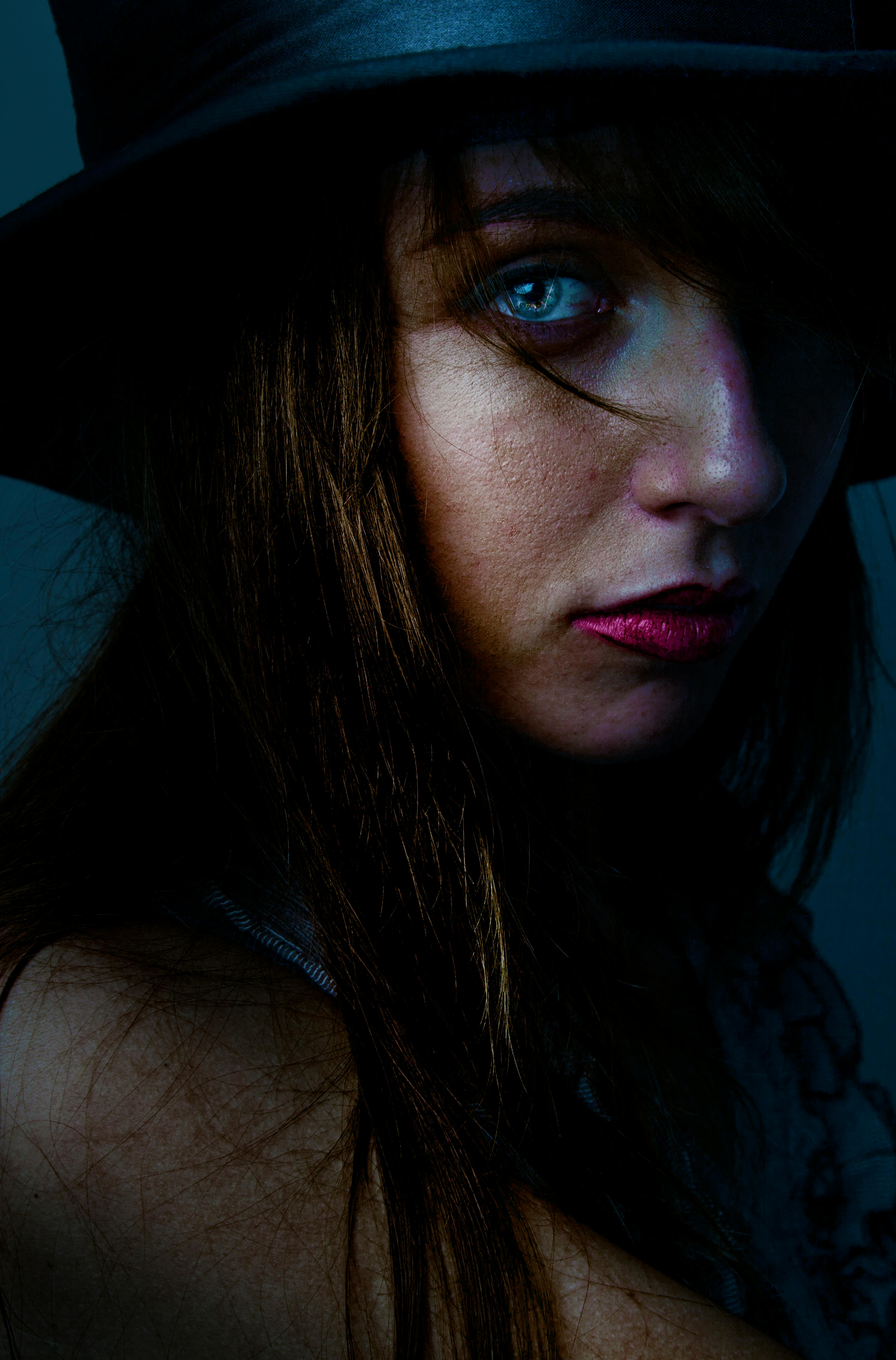 Close Up Photo of a Woman Looking Sideways · Free Stock Photo