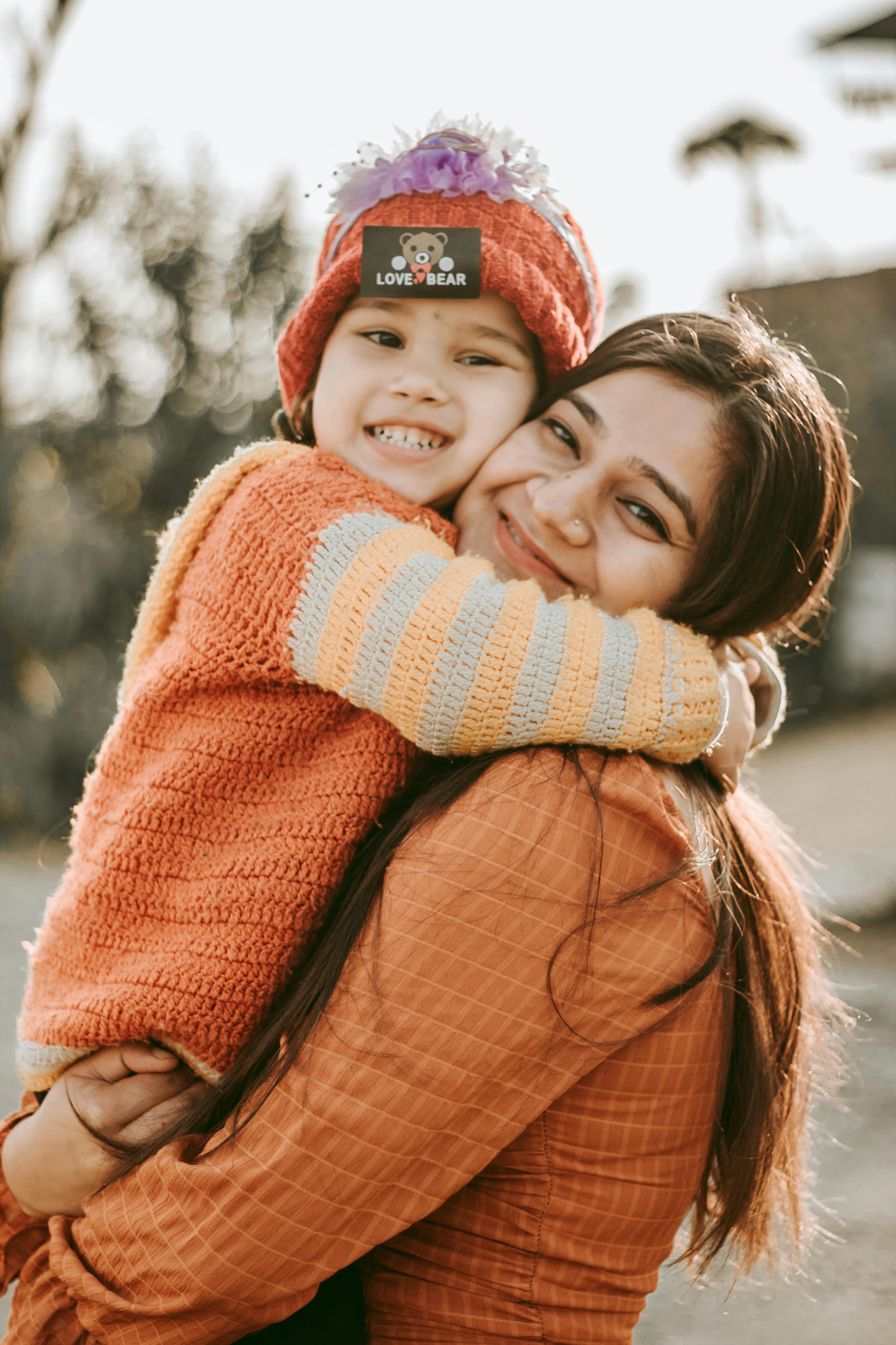 Woman Carrying a Girl · Free Stock Photo