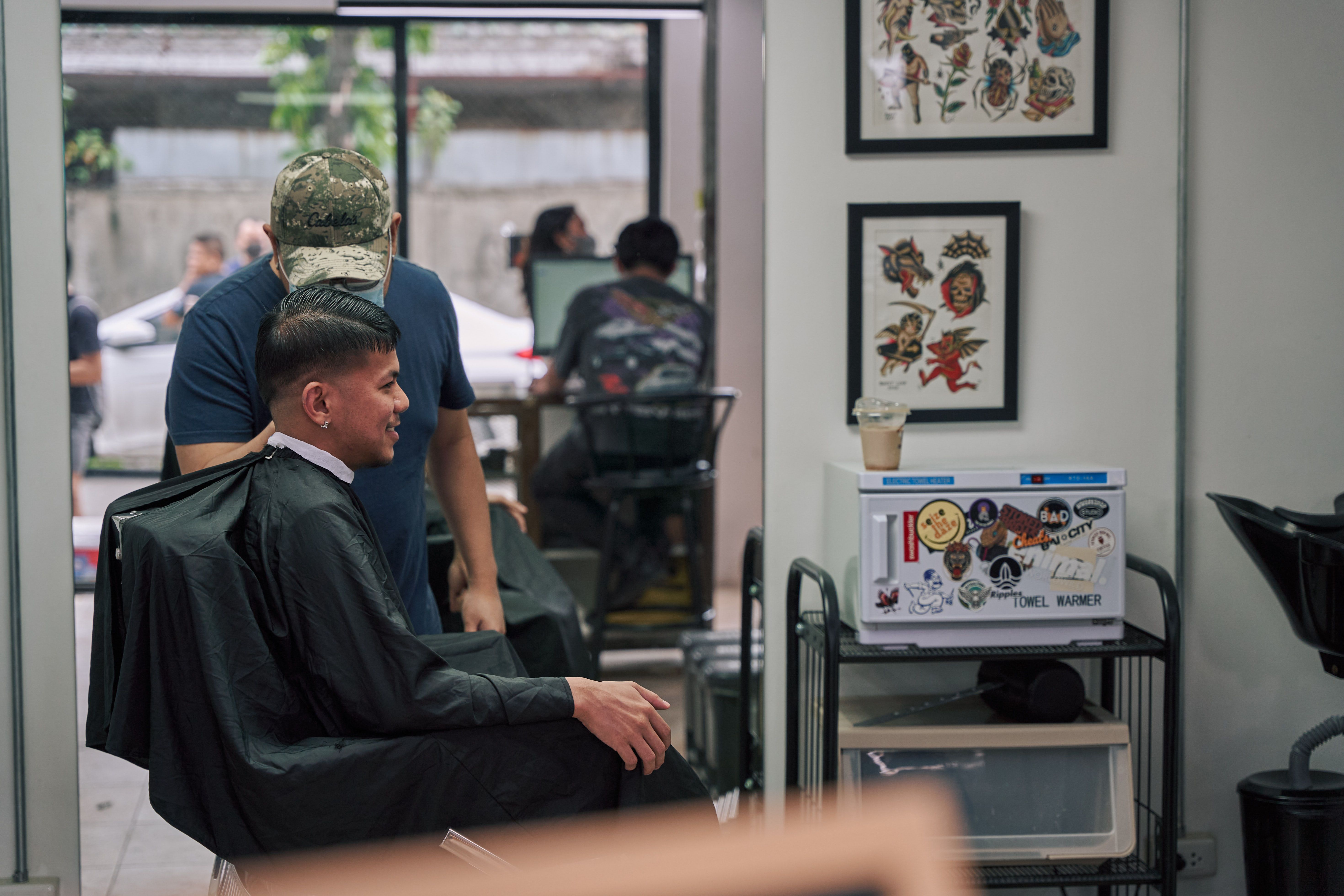 Man Getting a Haircut · Free Stock Photo