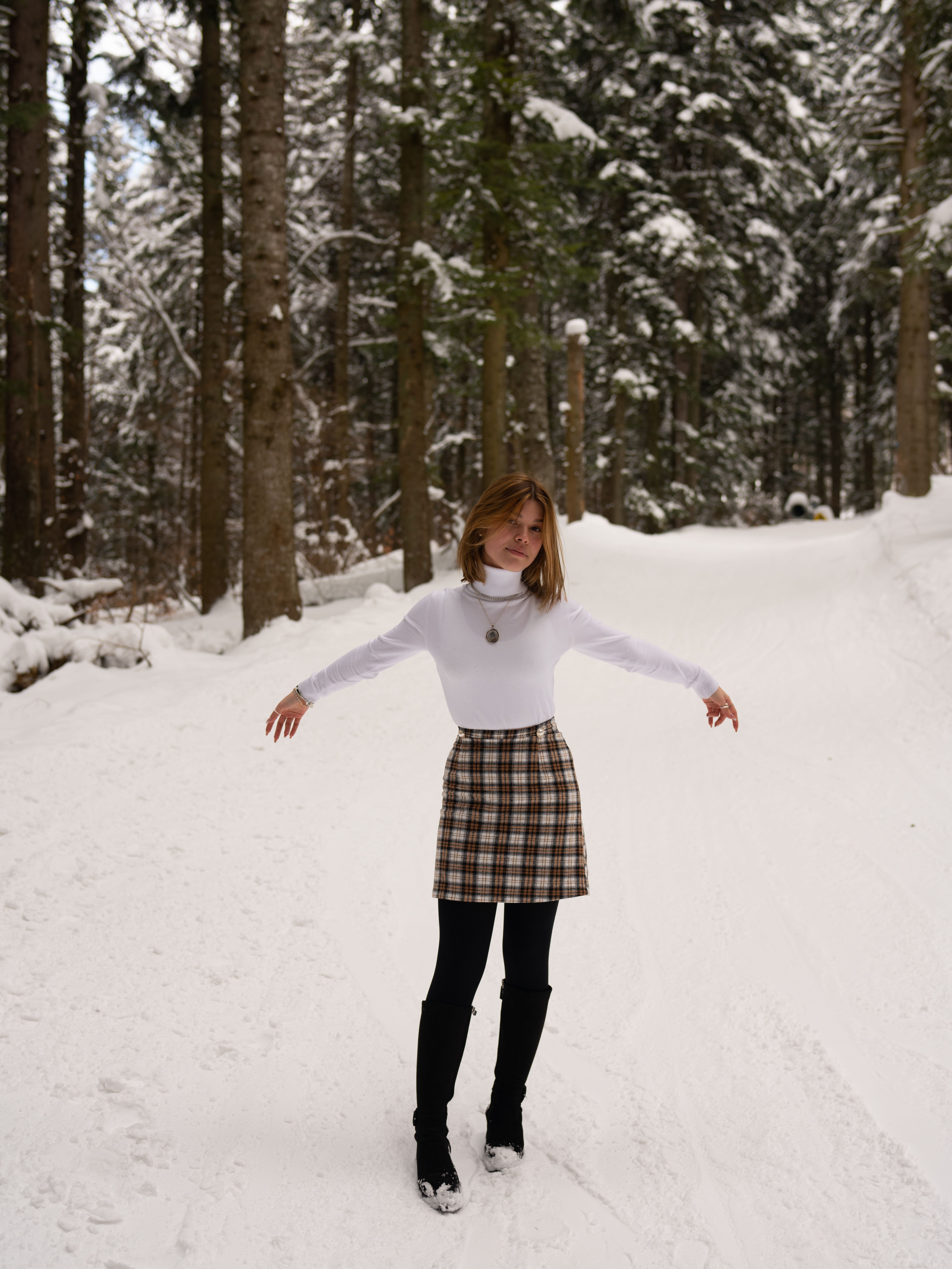Woman Wearing Coat Looking Over Her Shoulder · Free Stock Photo