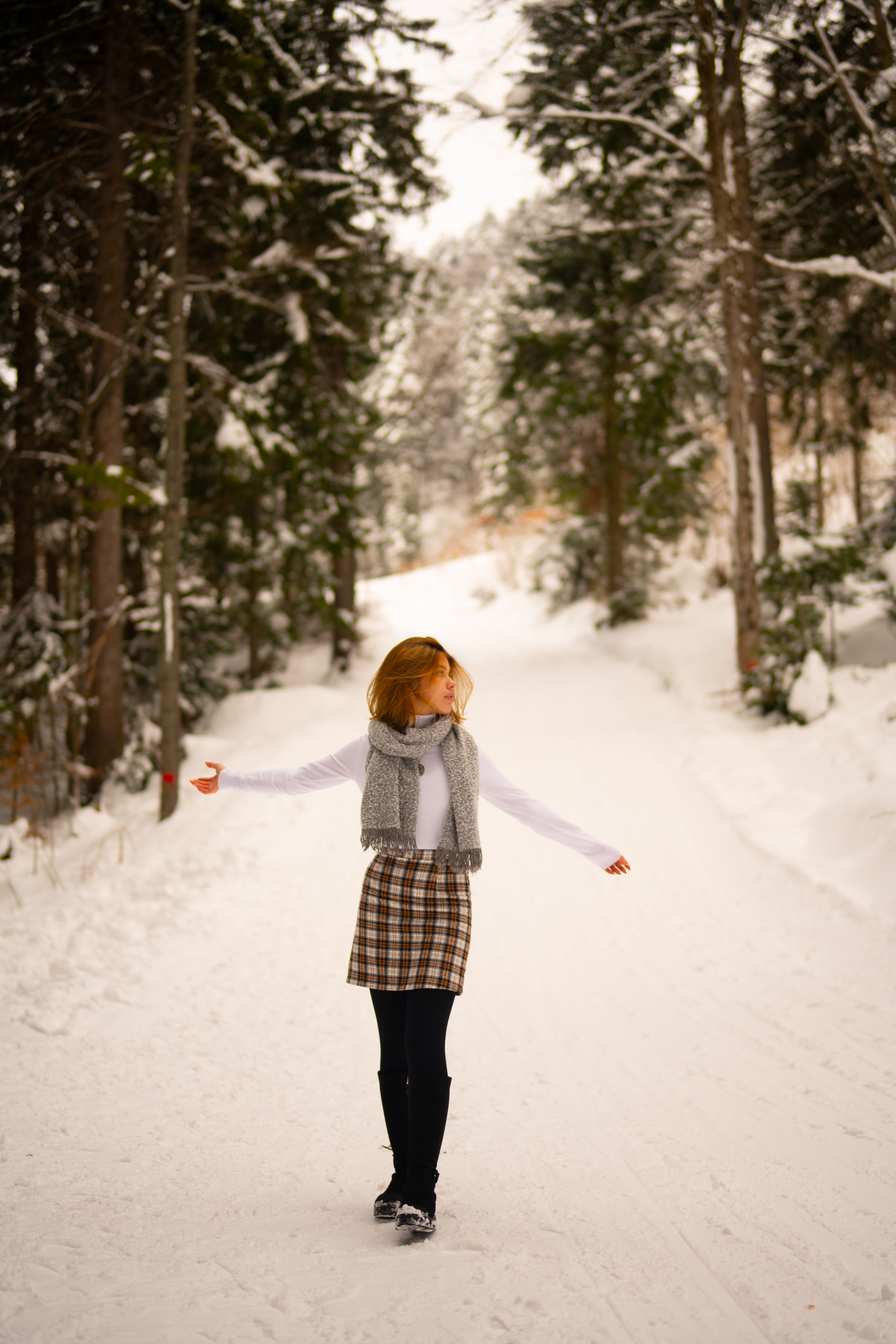 Woman Wearing Coat Looking Over Her Shoulder · Free Stock Photo