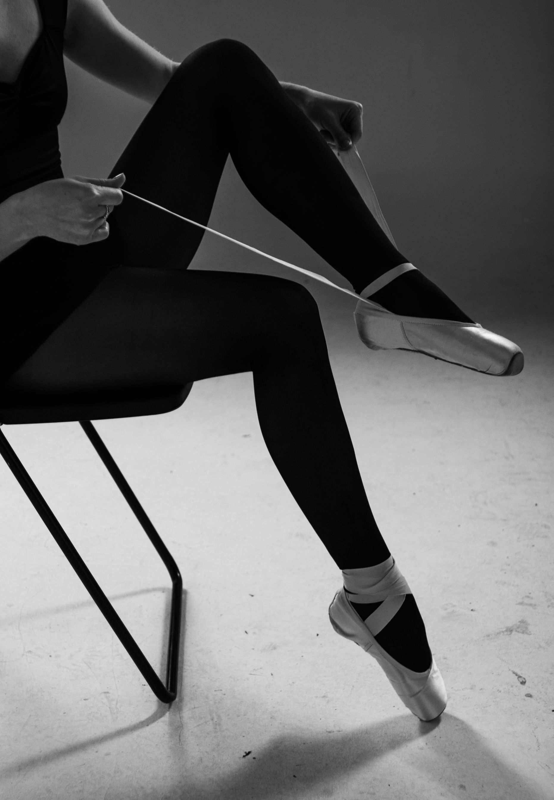 Ballet Dancer Putting On Shoes · Free Stock Photo