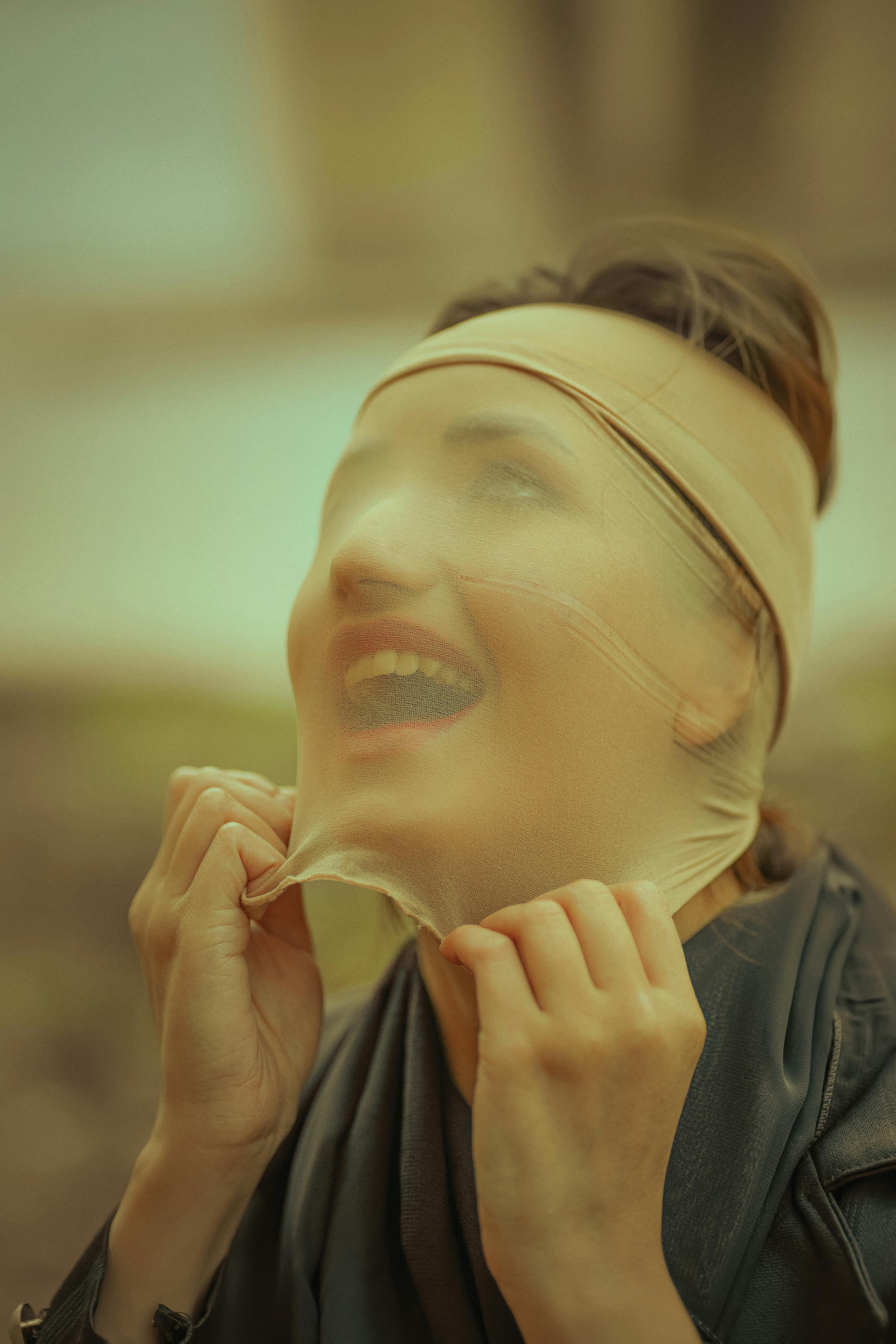 Woman Wearing a Stocking on Her Head and Screaming · Free Stock Photo