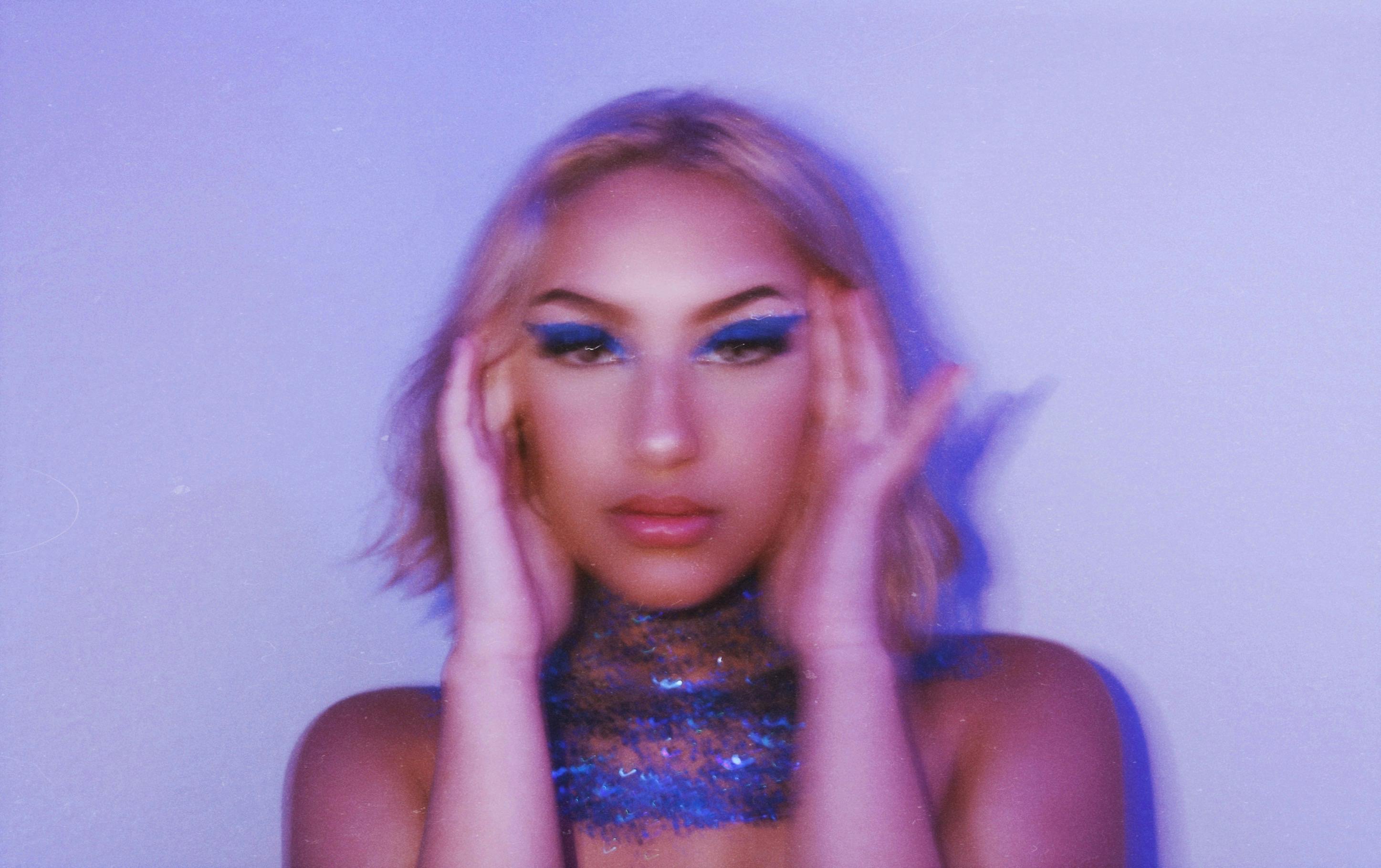 Beautiful Blonde Woman Wearing Red Cape · Free Stock Photo