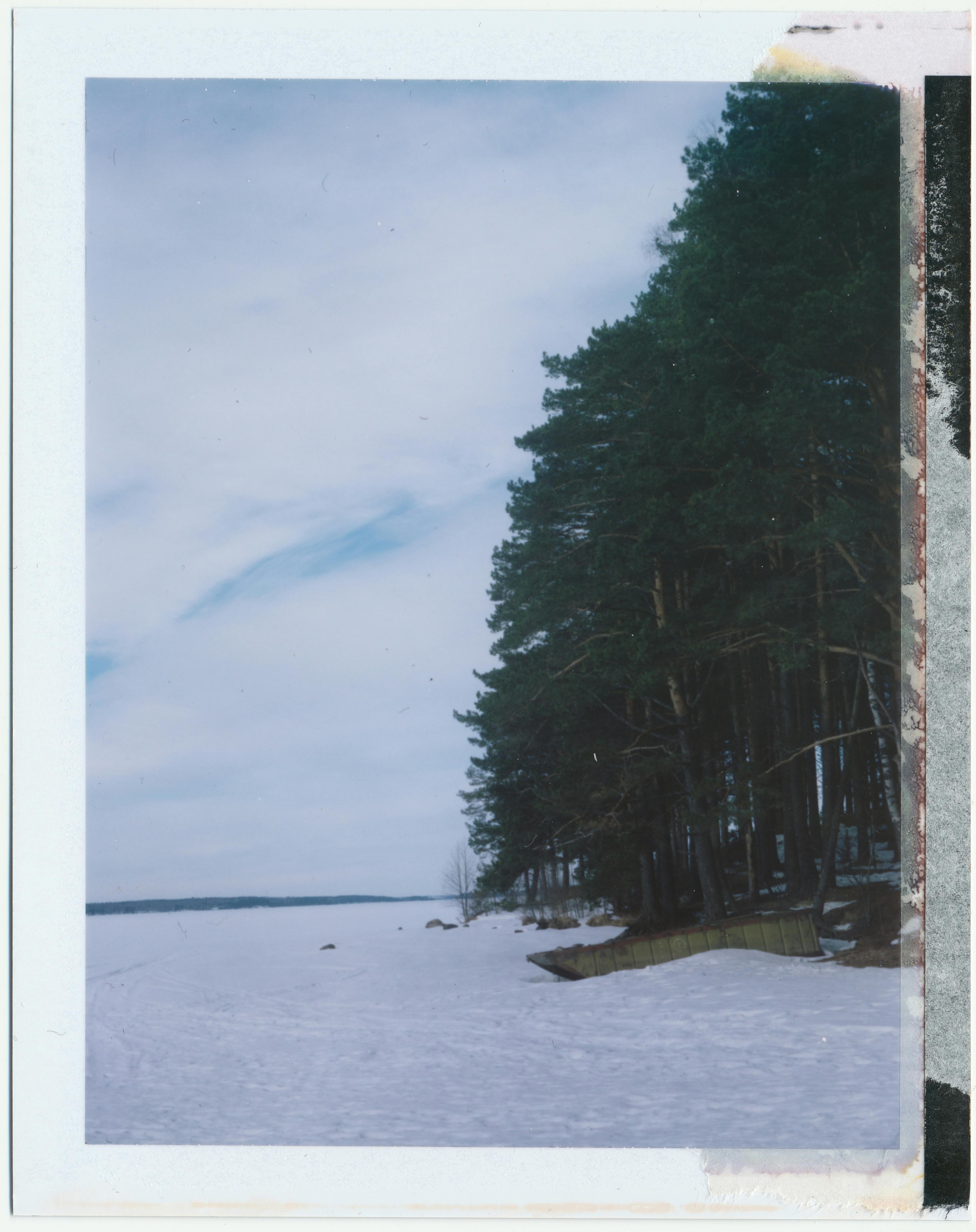 Polaroid Photo of a Snow Covered Shoreline · Free Stock Photo