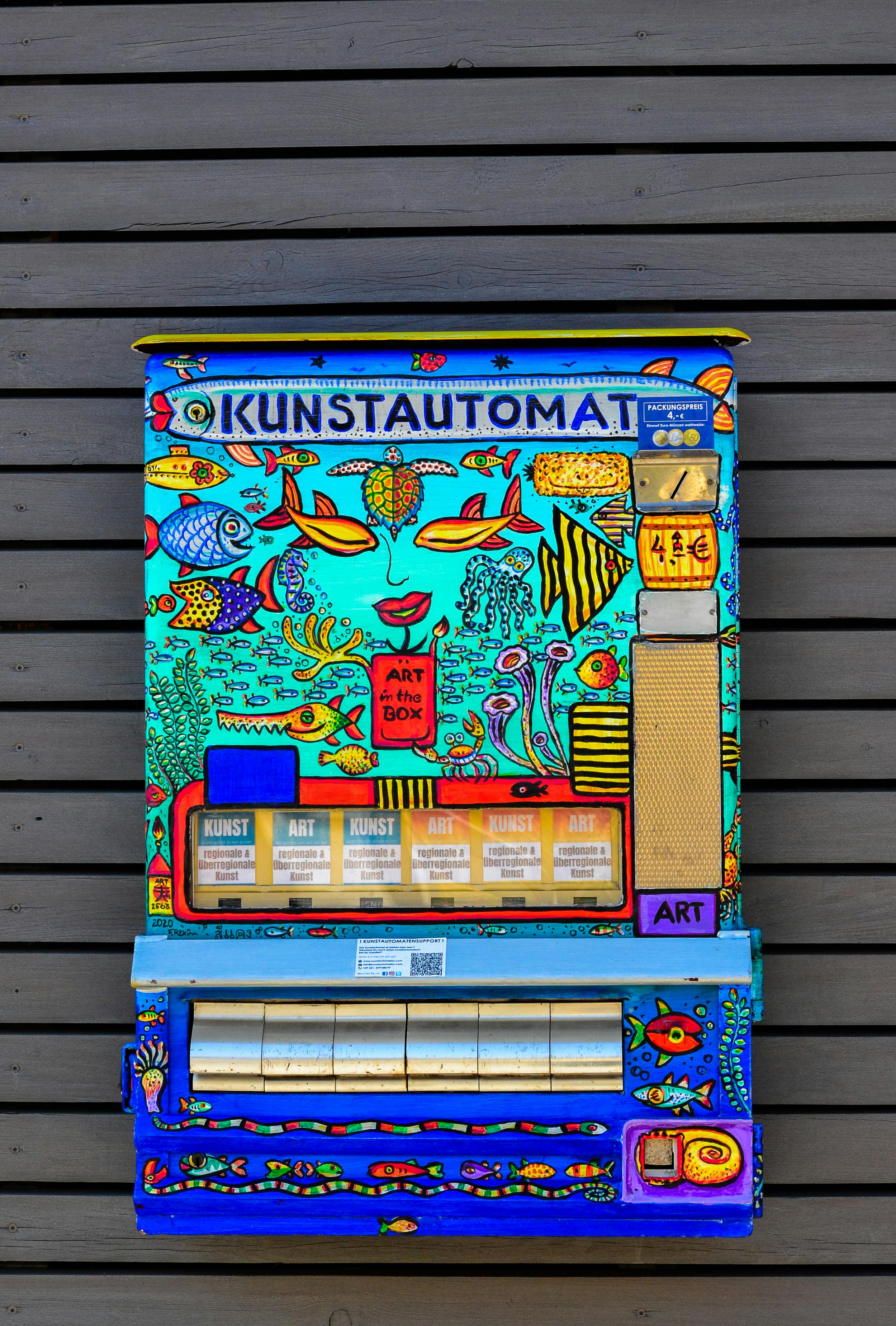 Close-Up Photo of Vending Machine on Street Sidewalk · Free Stock Photo