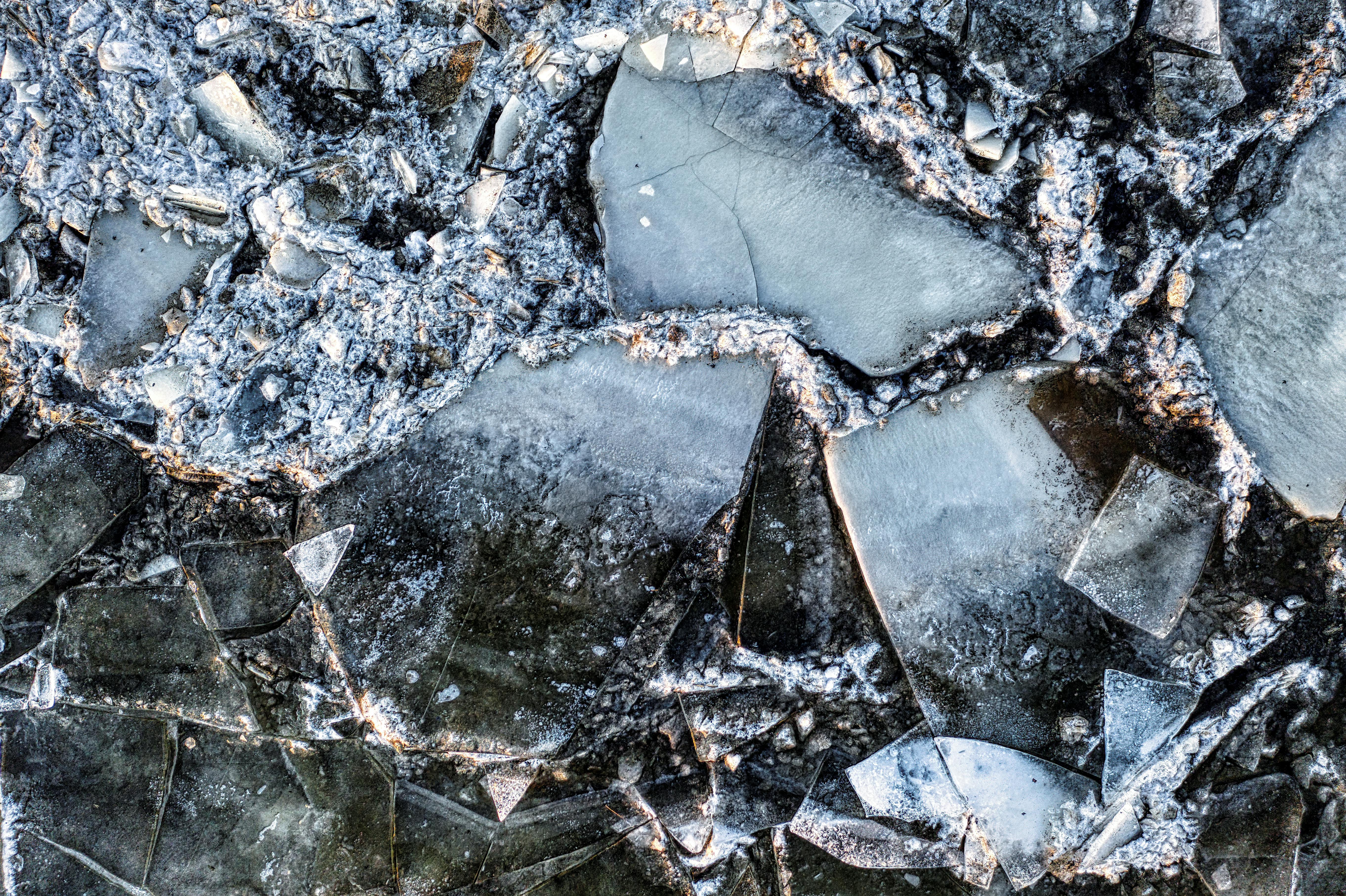 Broken Ice on Frozen Ground · Free Stock Photo