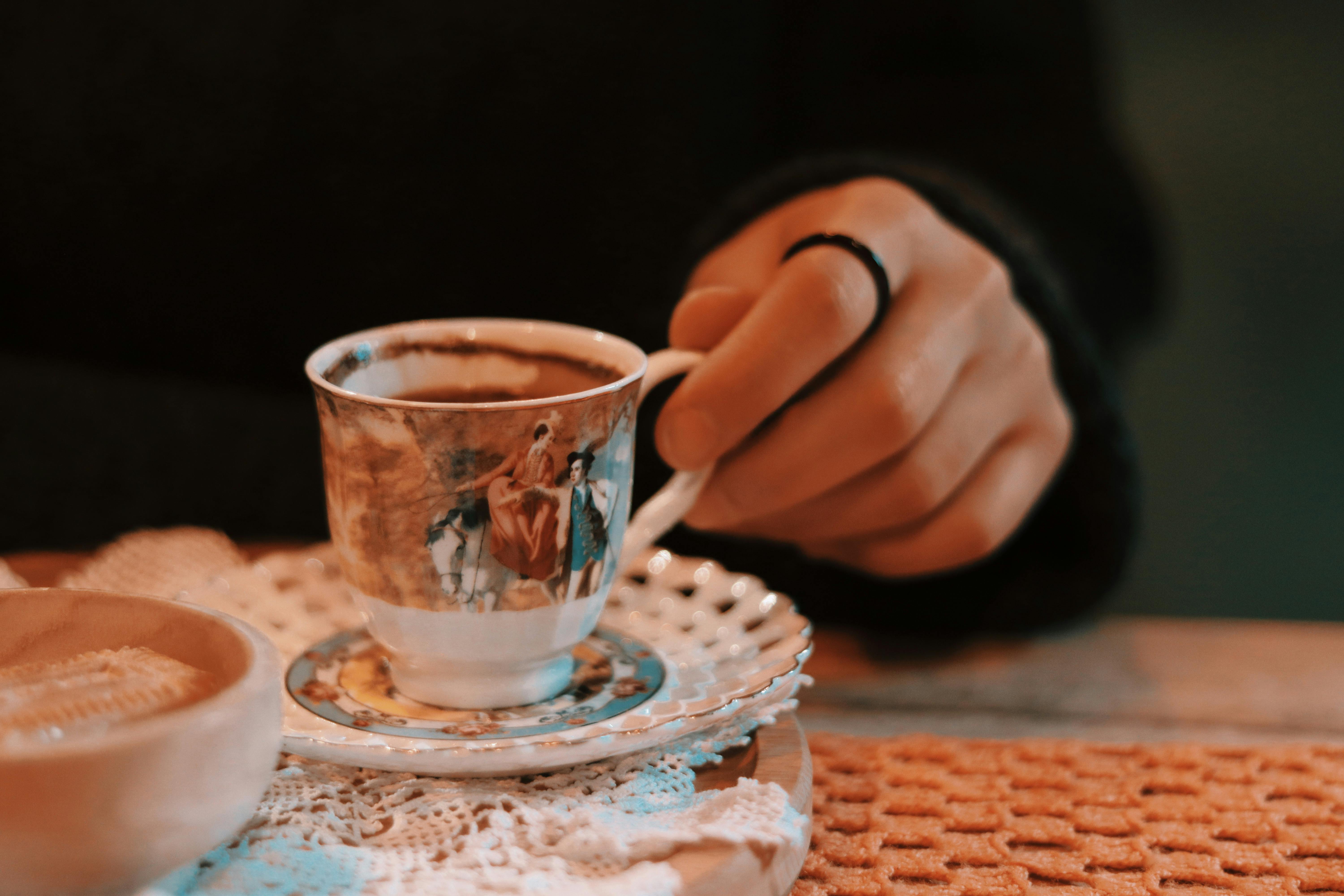 Person Holding Red Plastic Cup · Free Stock Photo