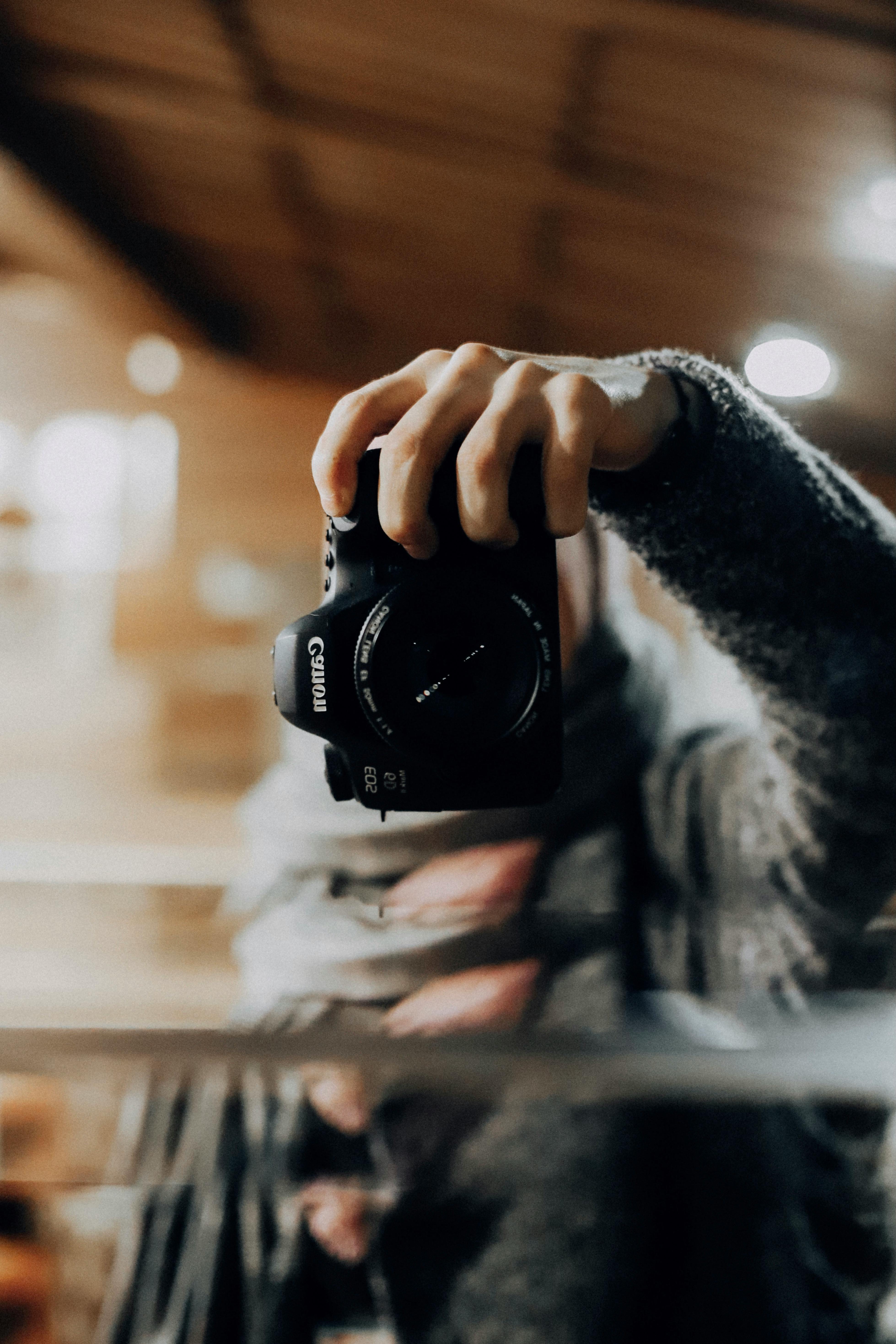 A Person Holding a Camera · Free Stock Photo