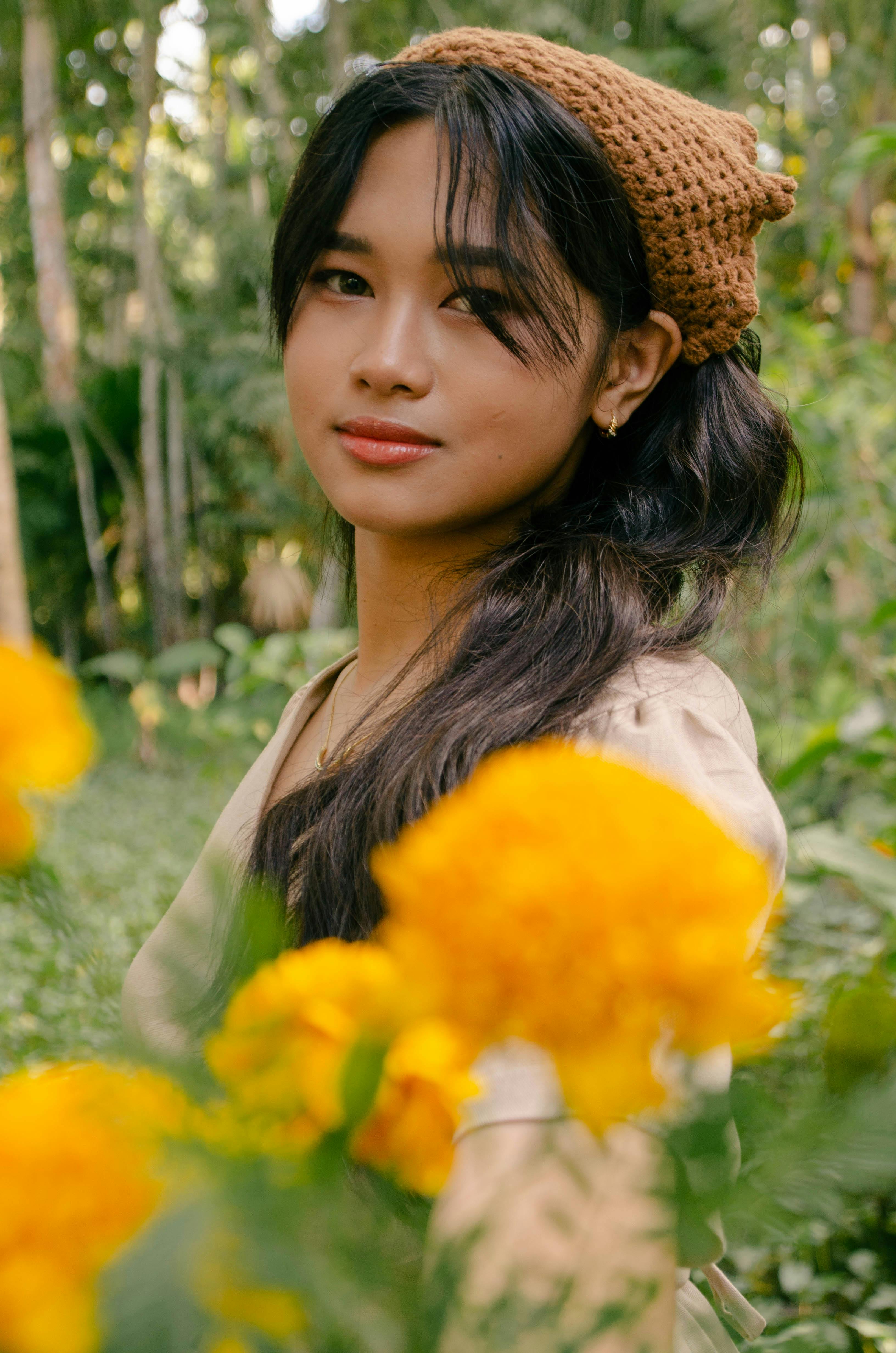 A Young Girl Holding a Light · Free Stock Photo