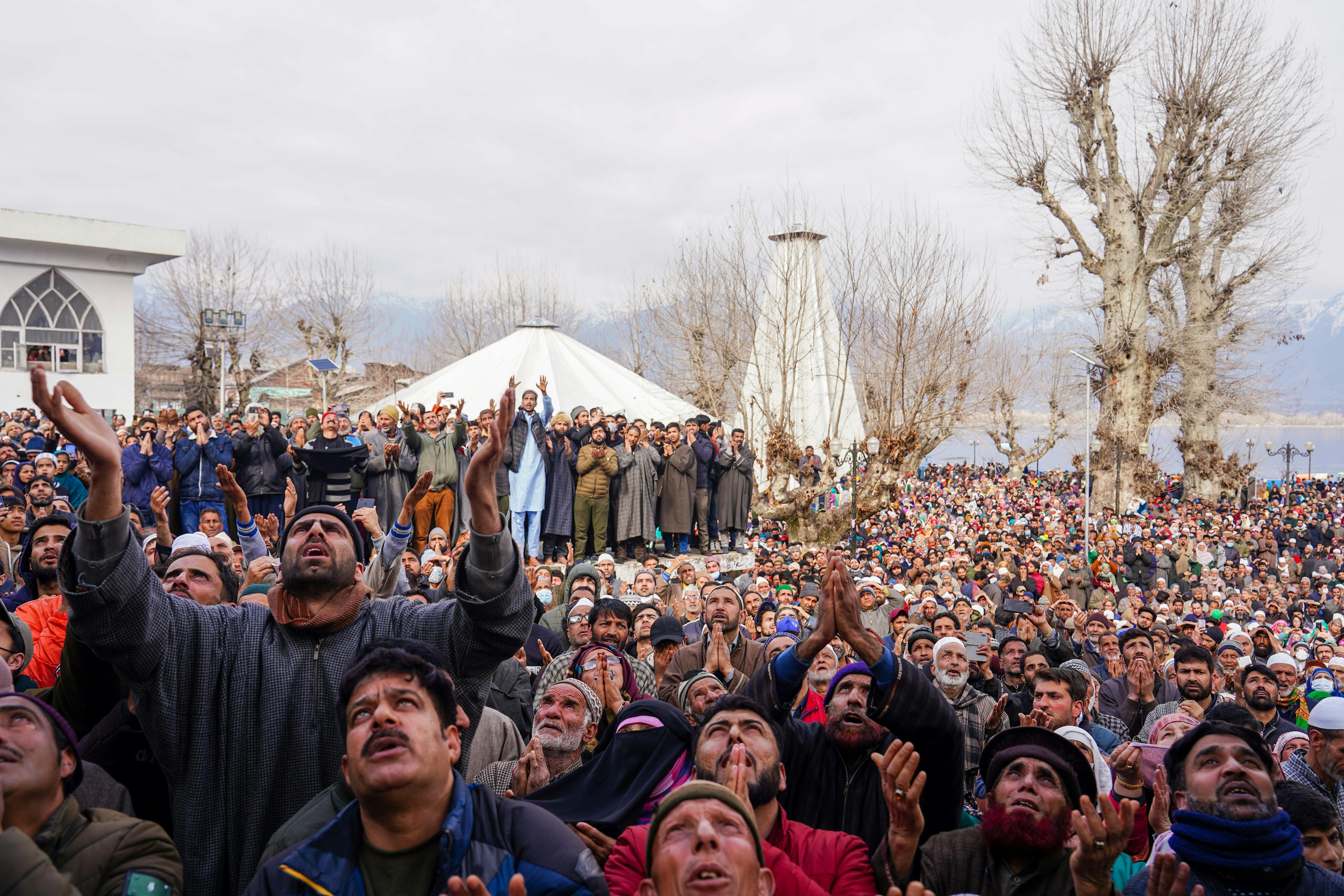 Crowd Praying with Arms Raised · Free Stock Photo