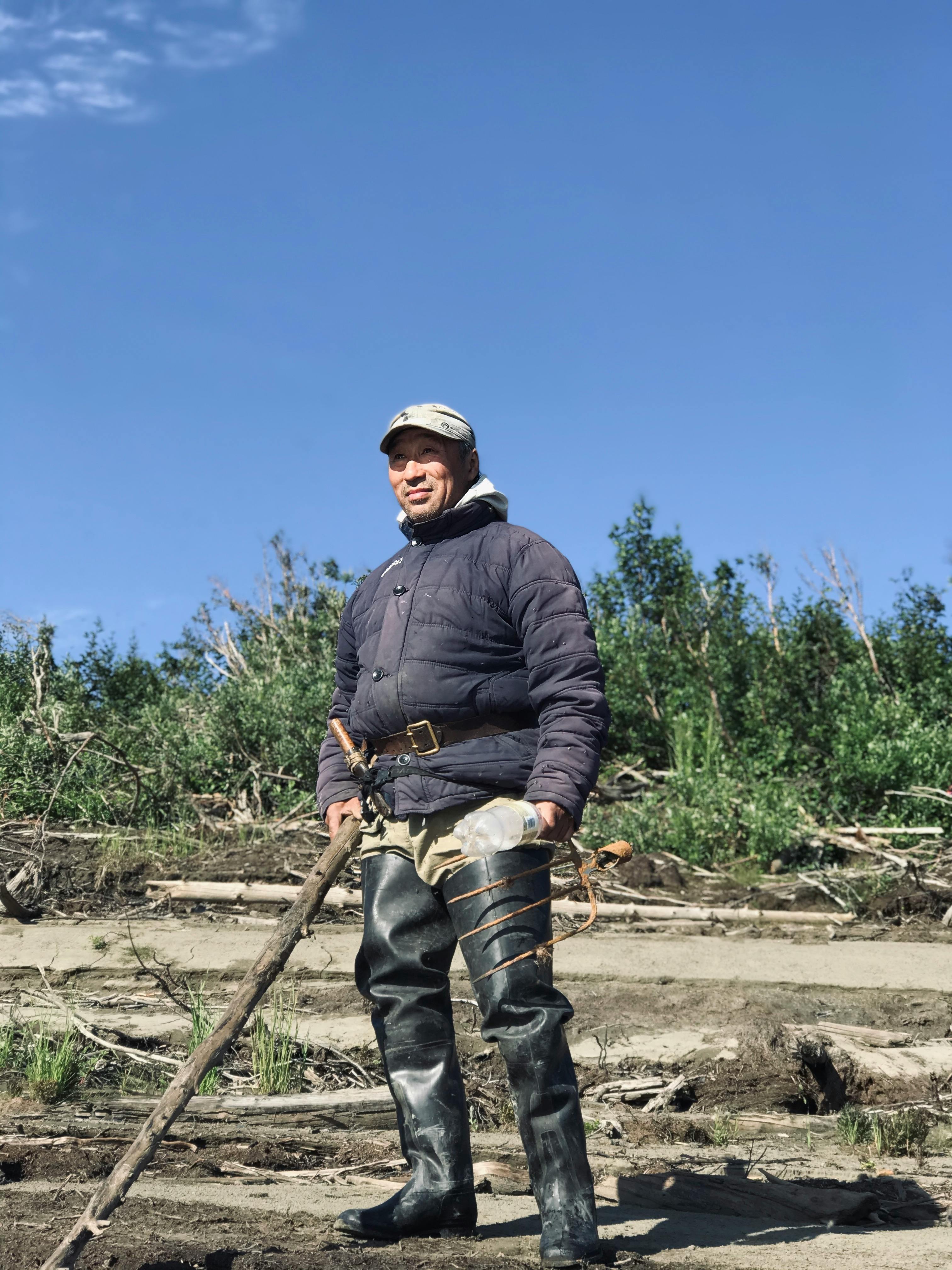 Photo of a Man Holding a Stick · Free Stock Photo