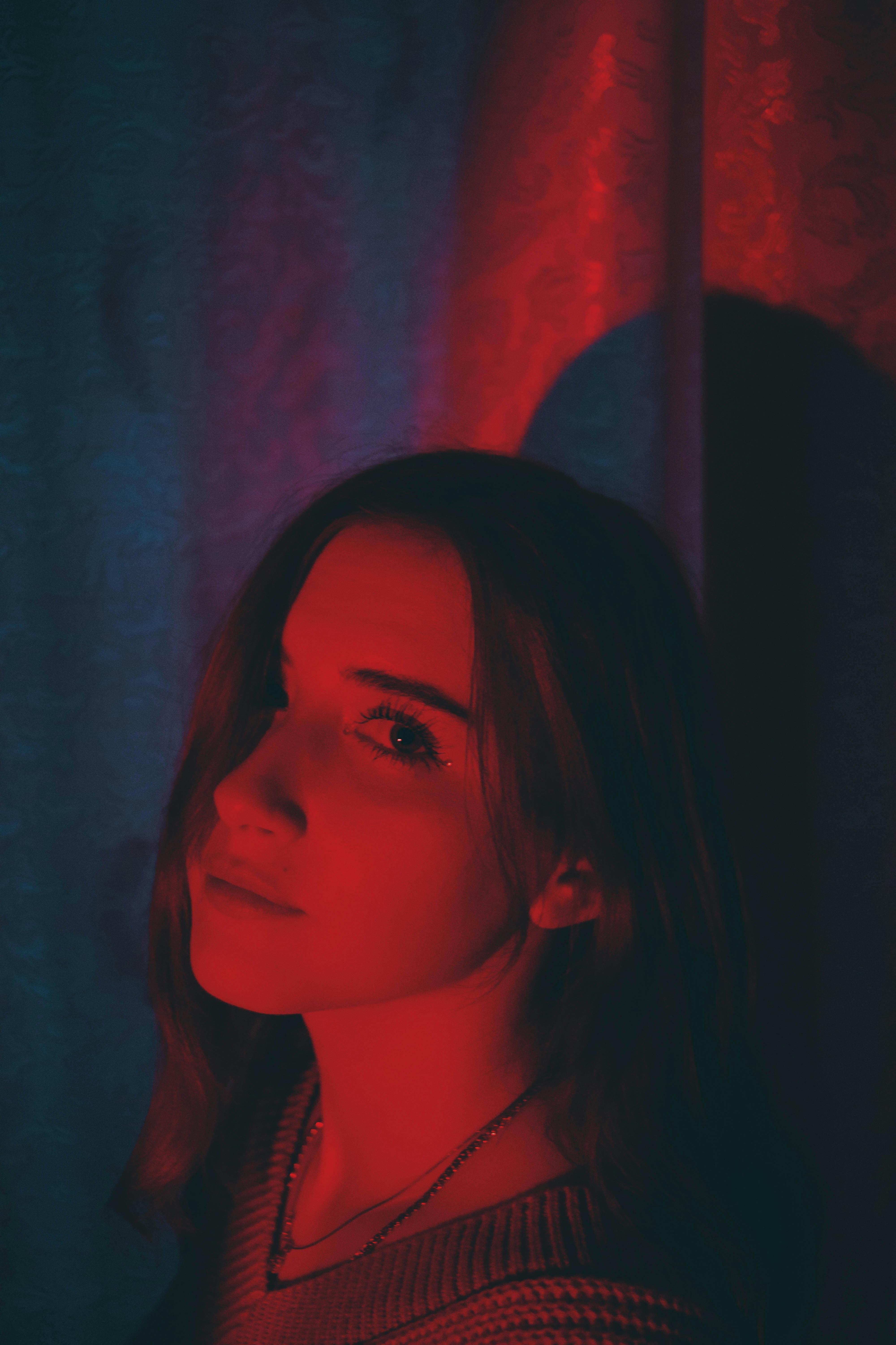 Portrait of Beautiful Woman in Red Light · Free Stock Photo