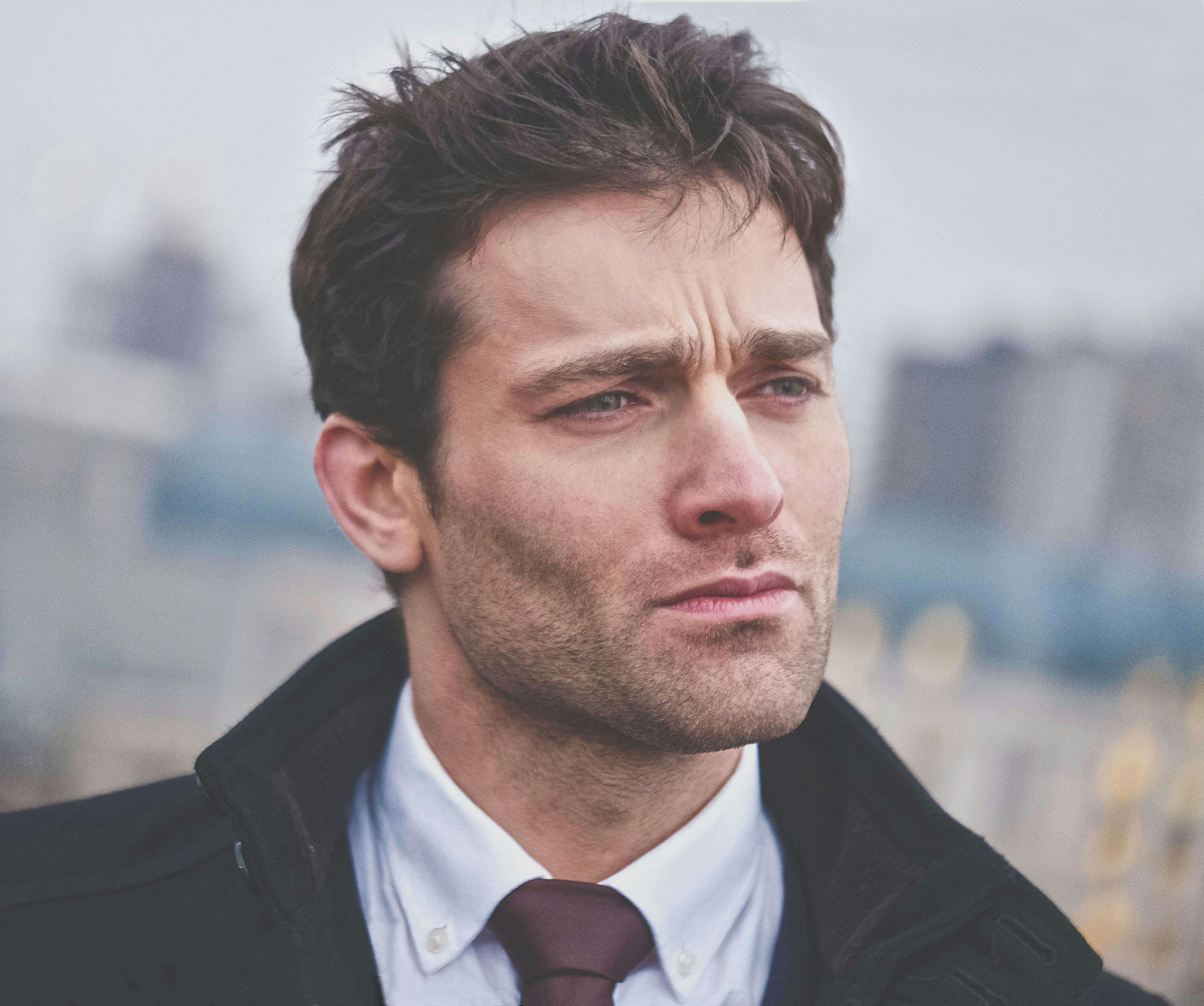 Gray Eyed Man in Close-Up Photography · Free Stock Photo