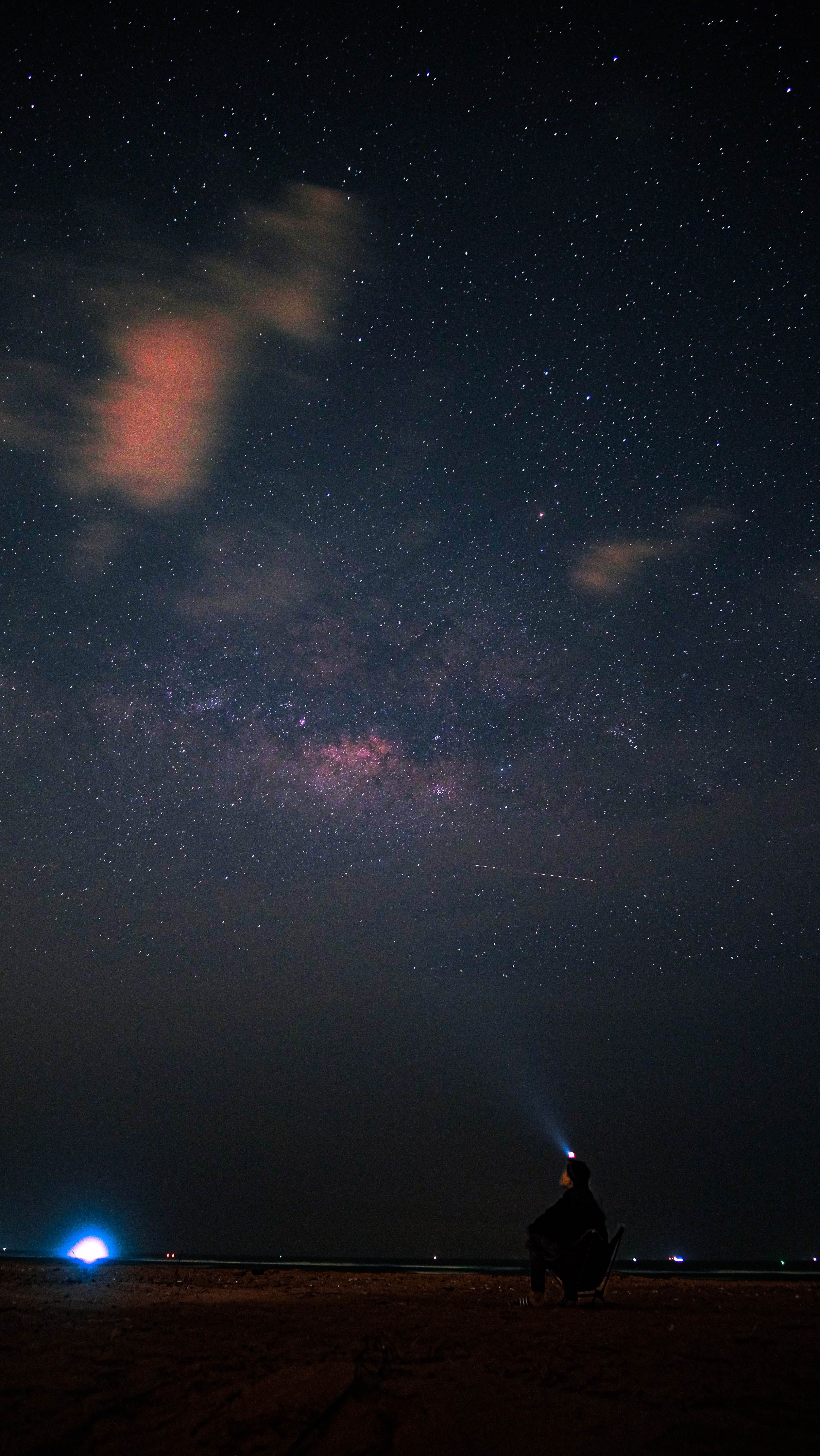 A Man Sitting on a Chair while Looking at the Beautiful Stars in the ...