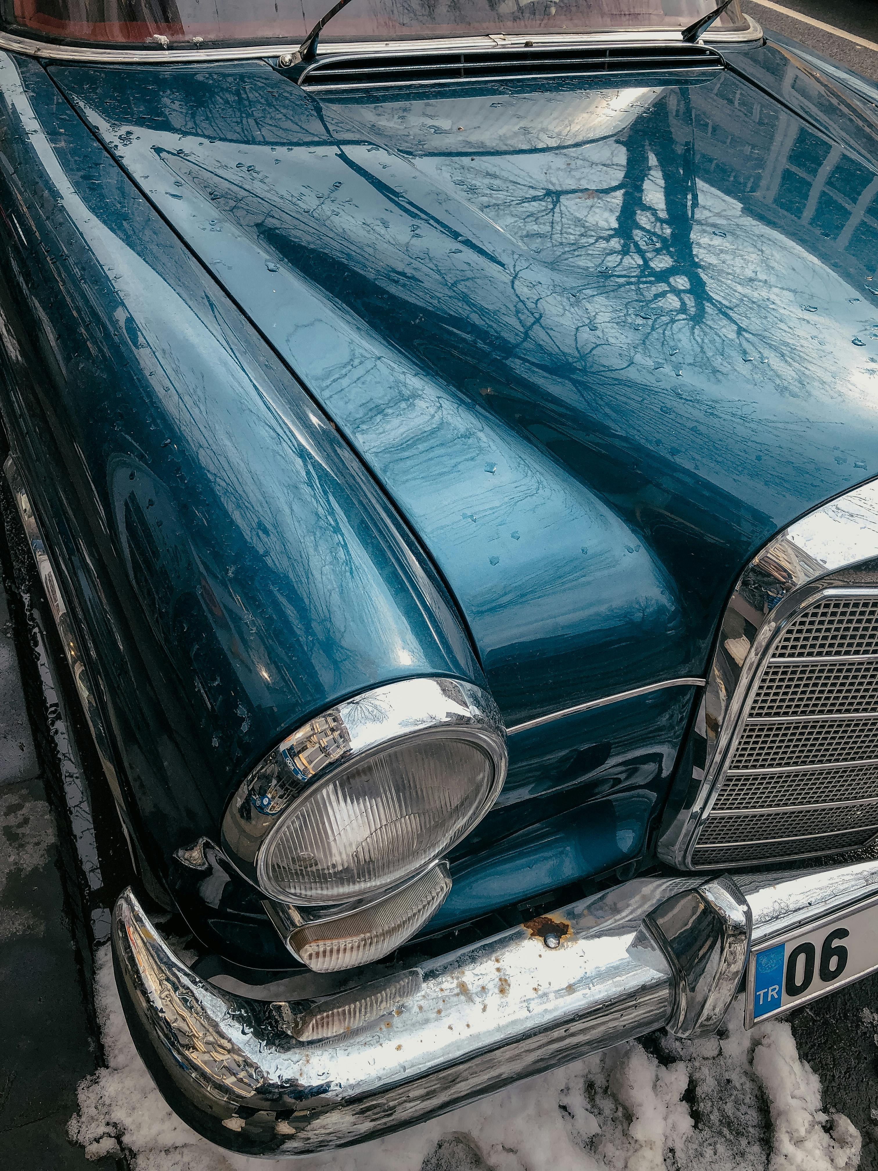 Blue Shiny Car in Close-up Photography · Free Stock Photo