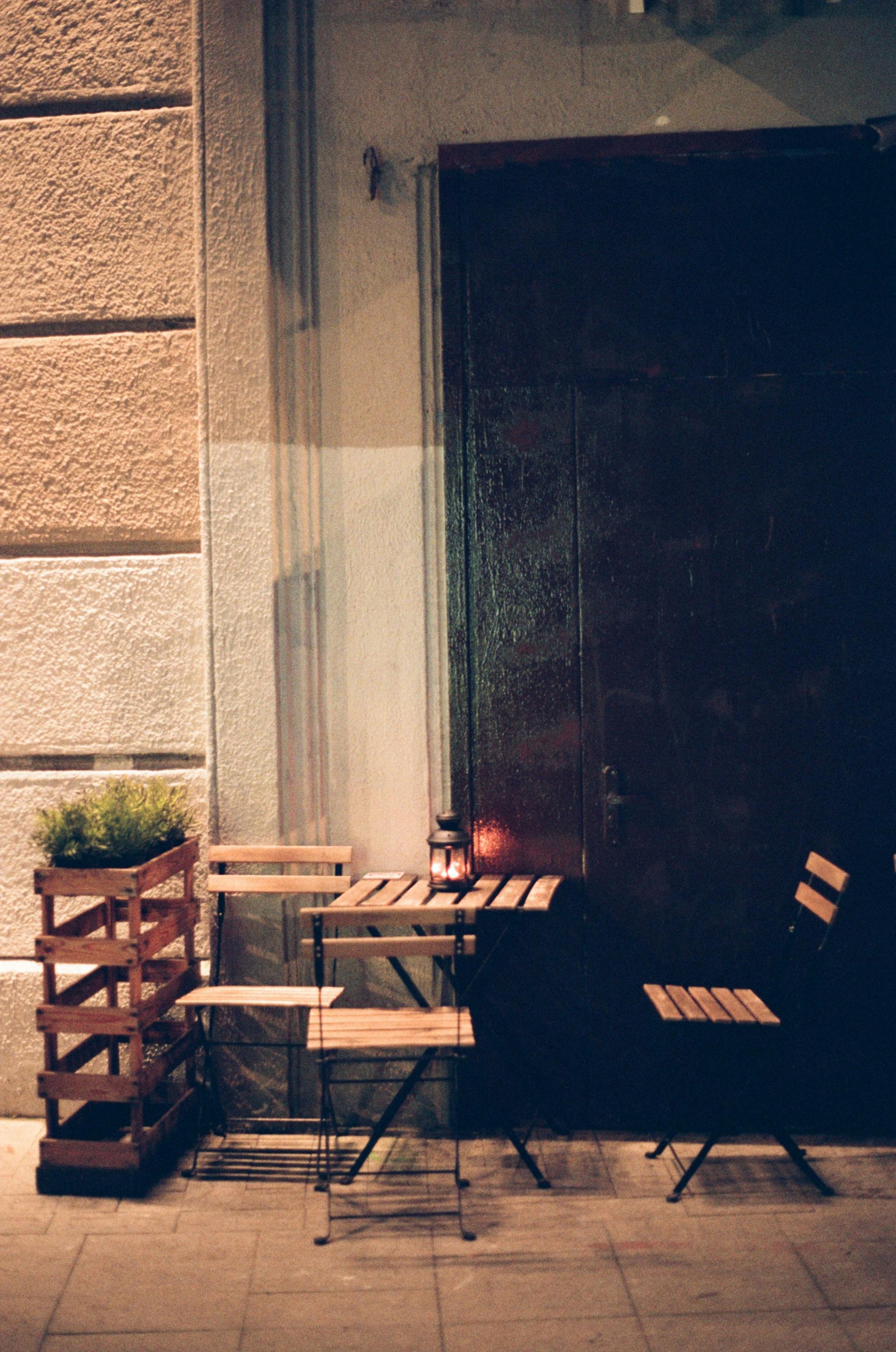 Chairs and Table Decorated with Potted Plants · Free Stock Photo
