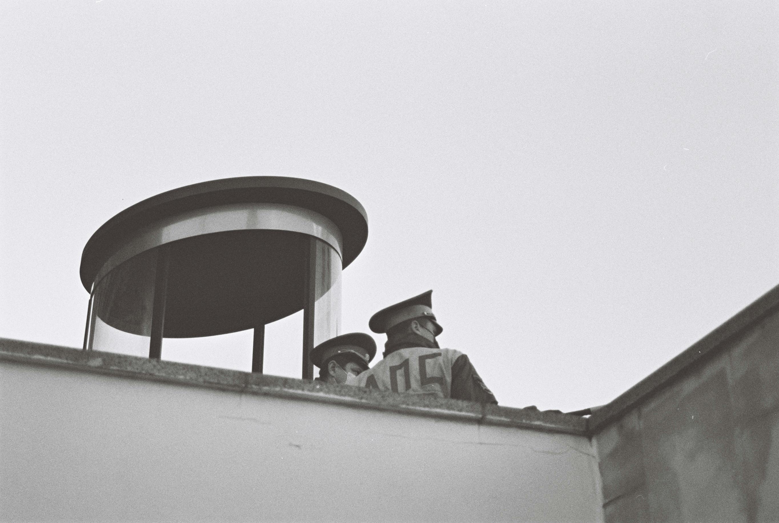 Police Officers on Roof · Free Stock Photo