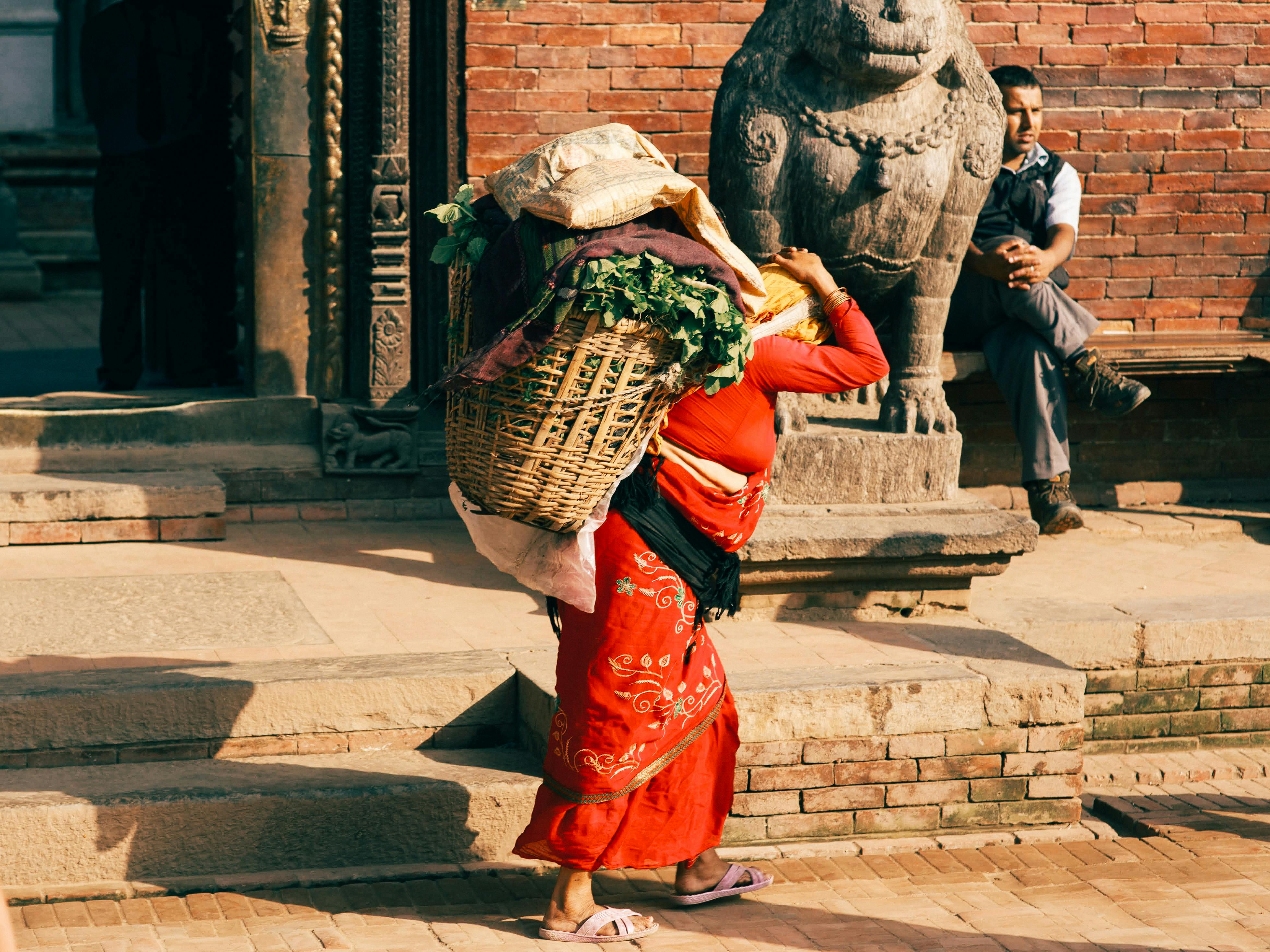 Women Carrying Heavy Loads · Free Stock Photo