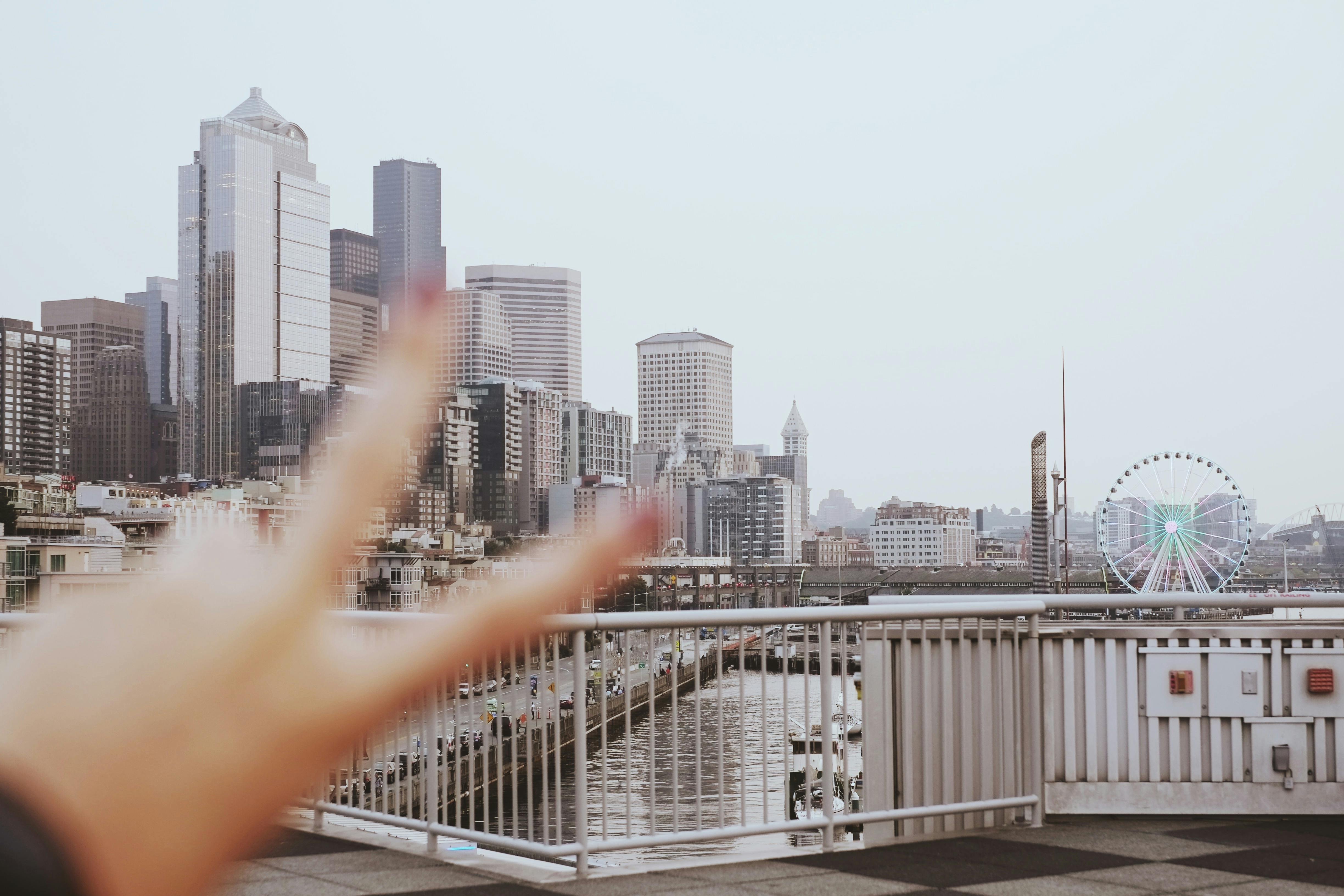 Hand with Victoria Gesture on Seatle Skyline, Washington, USA · Free ...