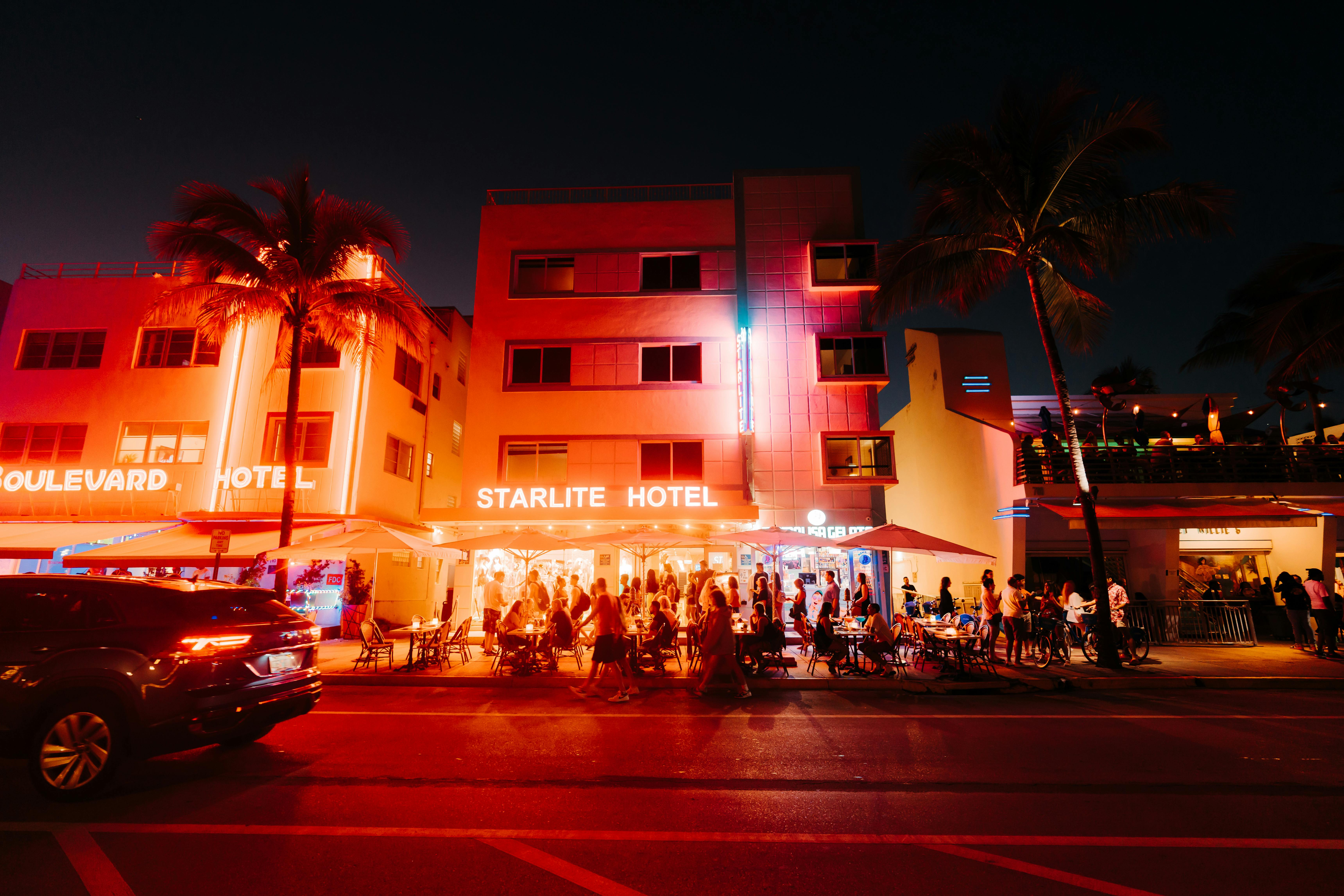 People in Front of a Hotel · Free Stock Photo