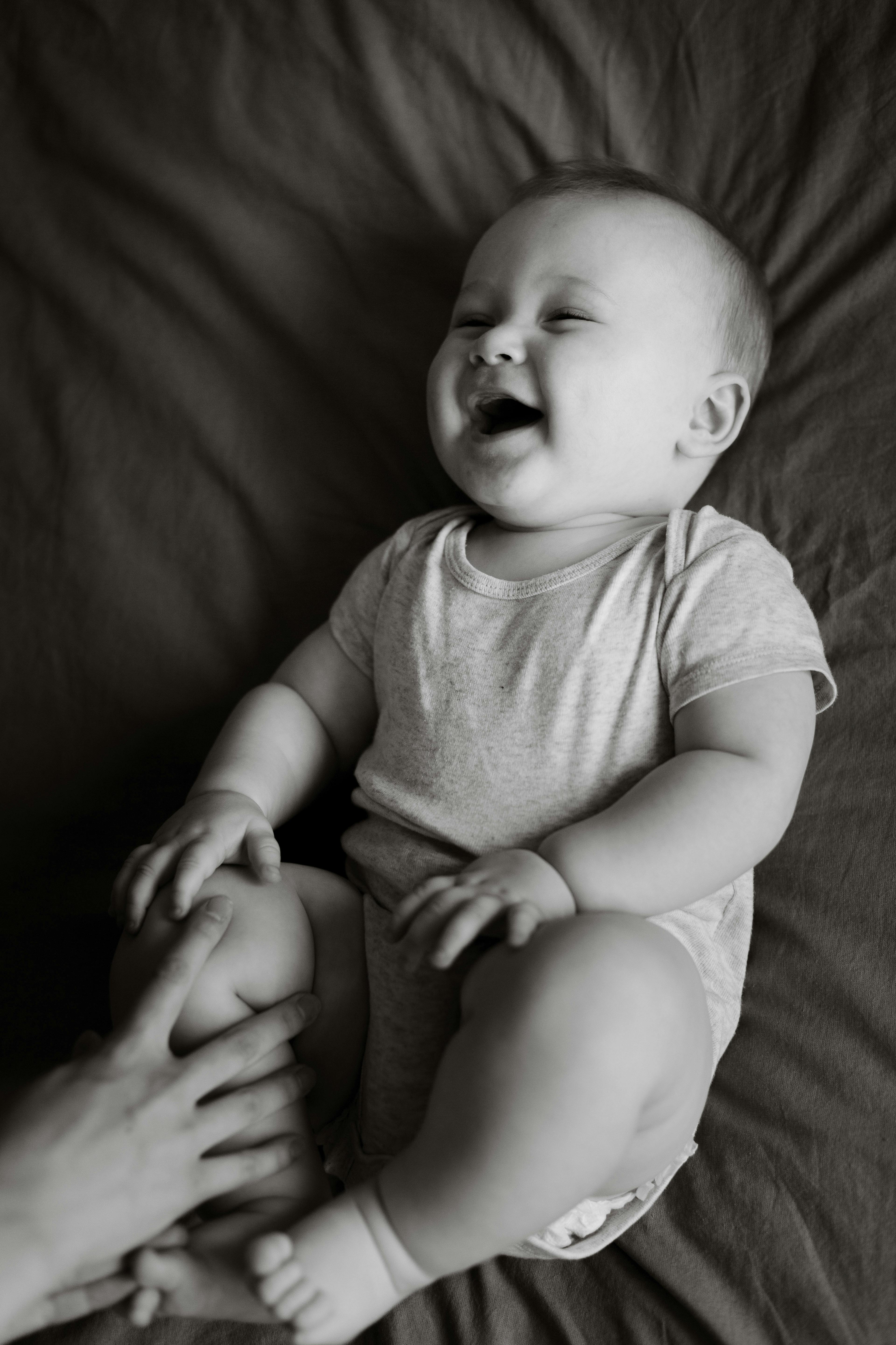 Grayscale Photo of a Baby · Free Stock Photo