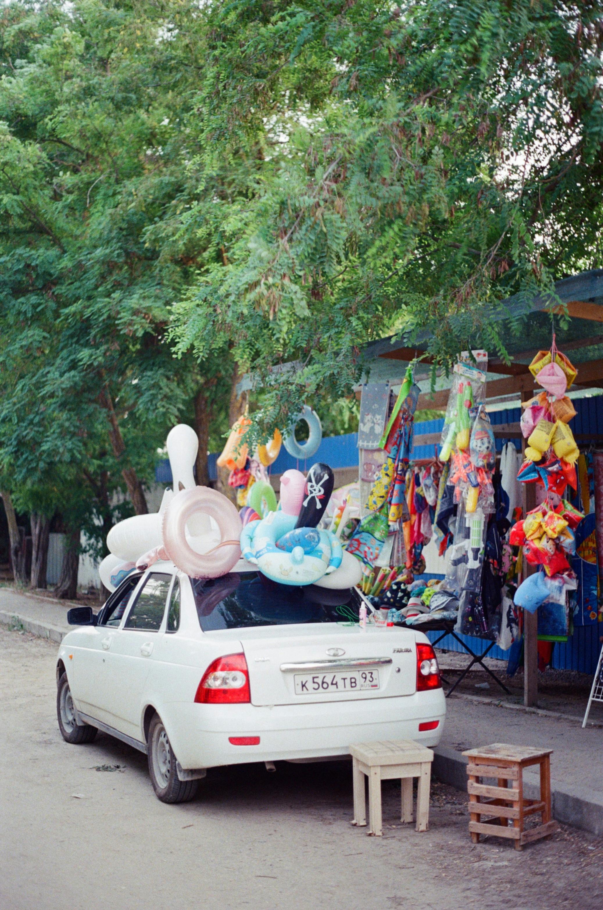 Market Stall with Inflatable Toys · Free Stock Photo