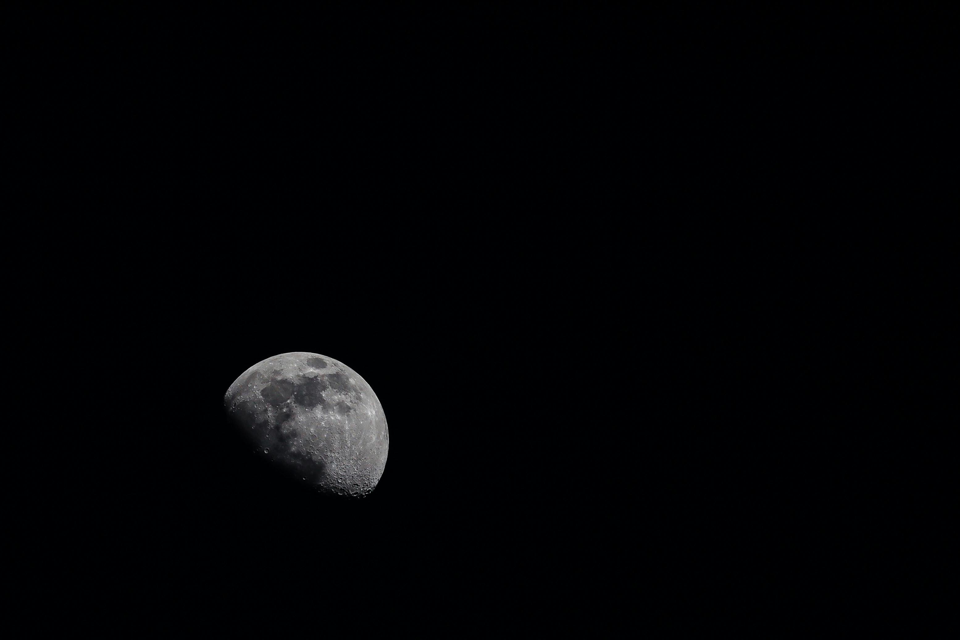 Black and White Photo of a Moon · Free Stock Photo