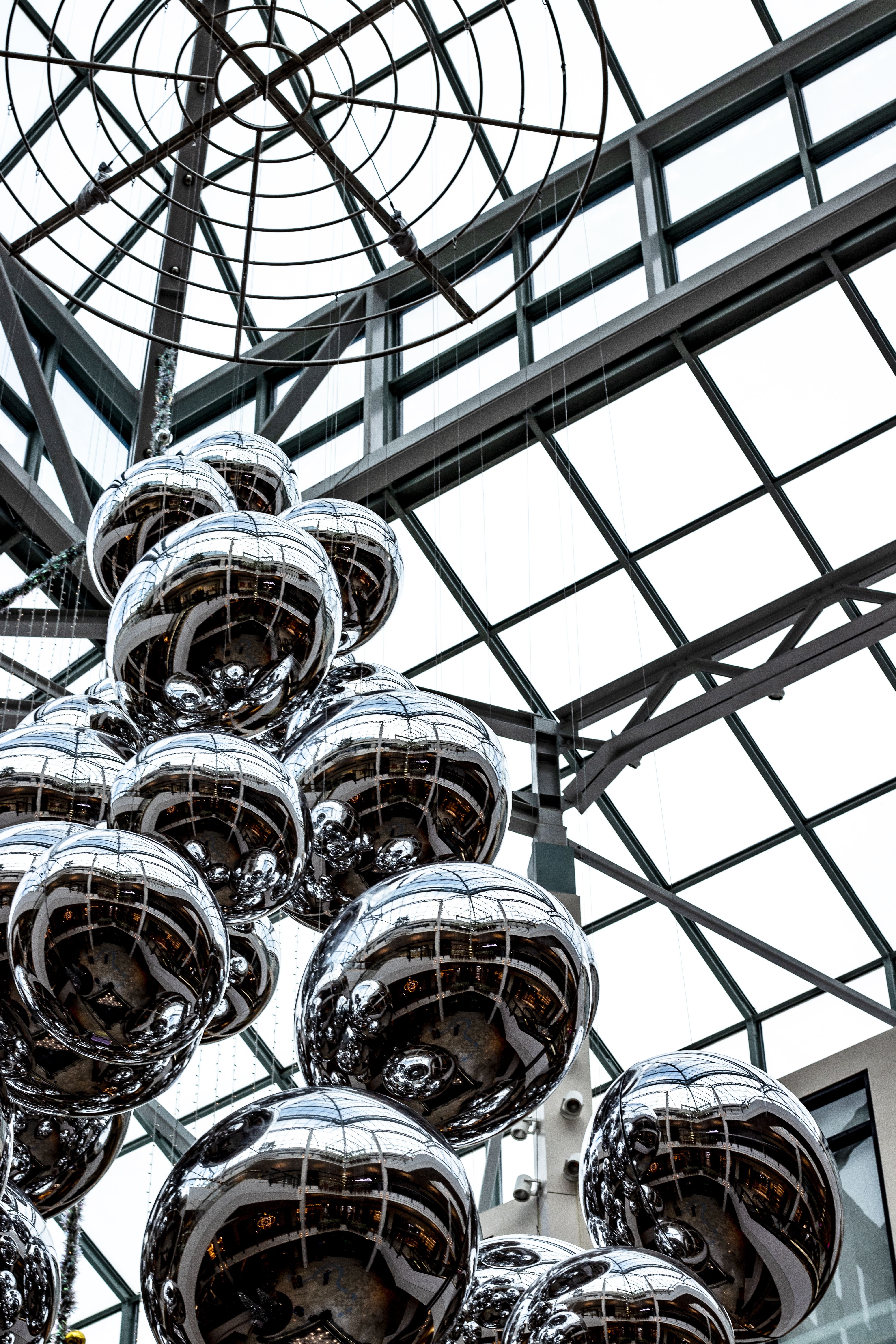 Stainless Ball Shape Decorations Hanging from a Ceiling · Free Stock Photo