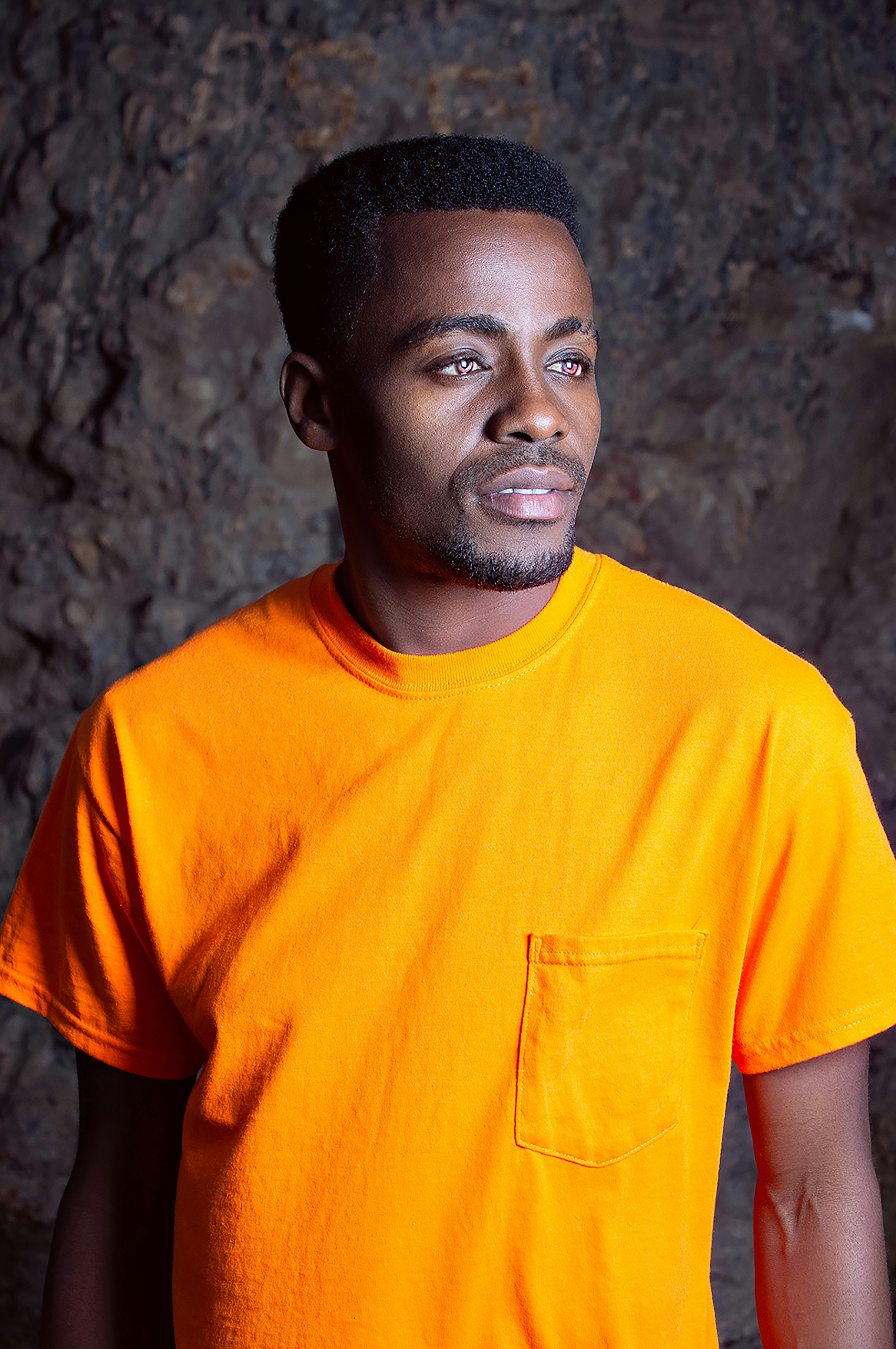 A Man Wearing Shell Accessories and a Straw Hat · Free Stock Photo