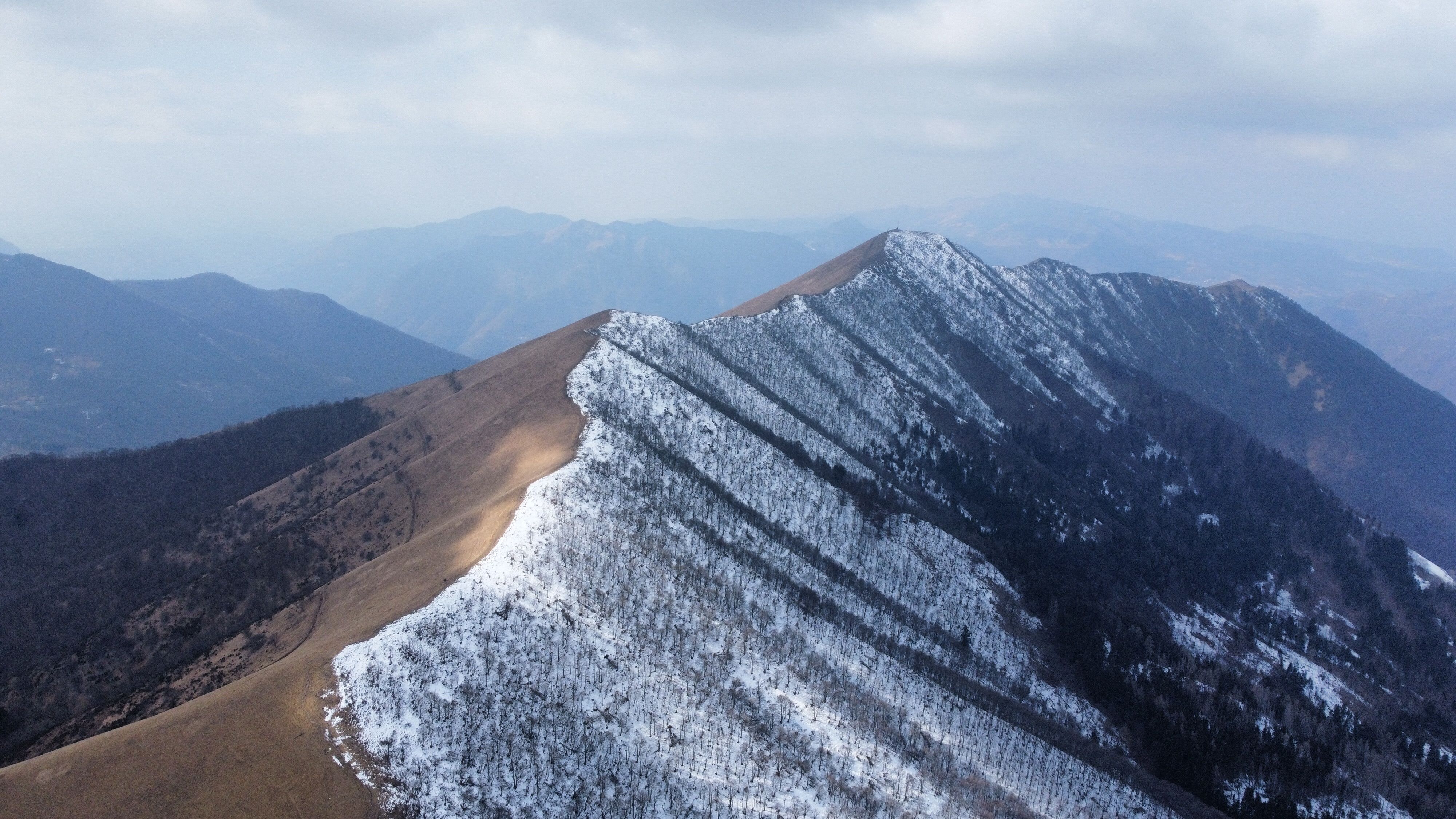 Snow Capped Mountain Ranges · Free Stock Photo