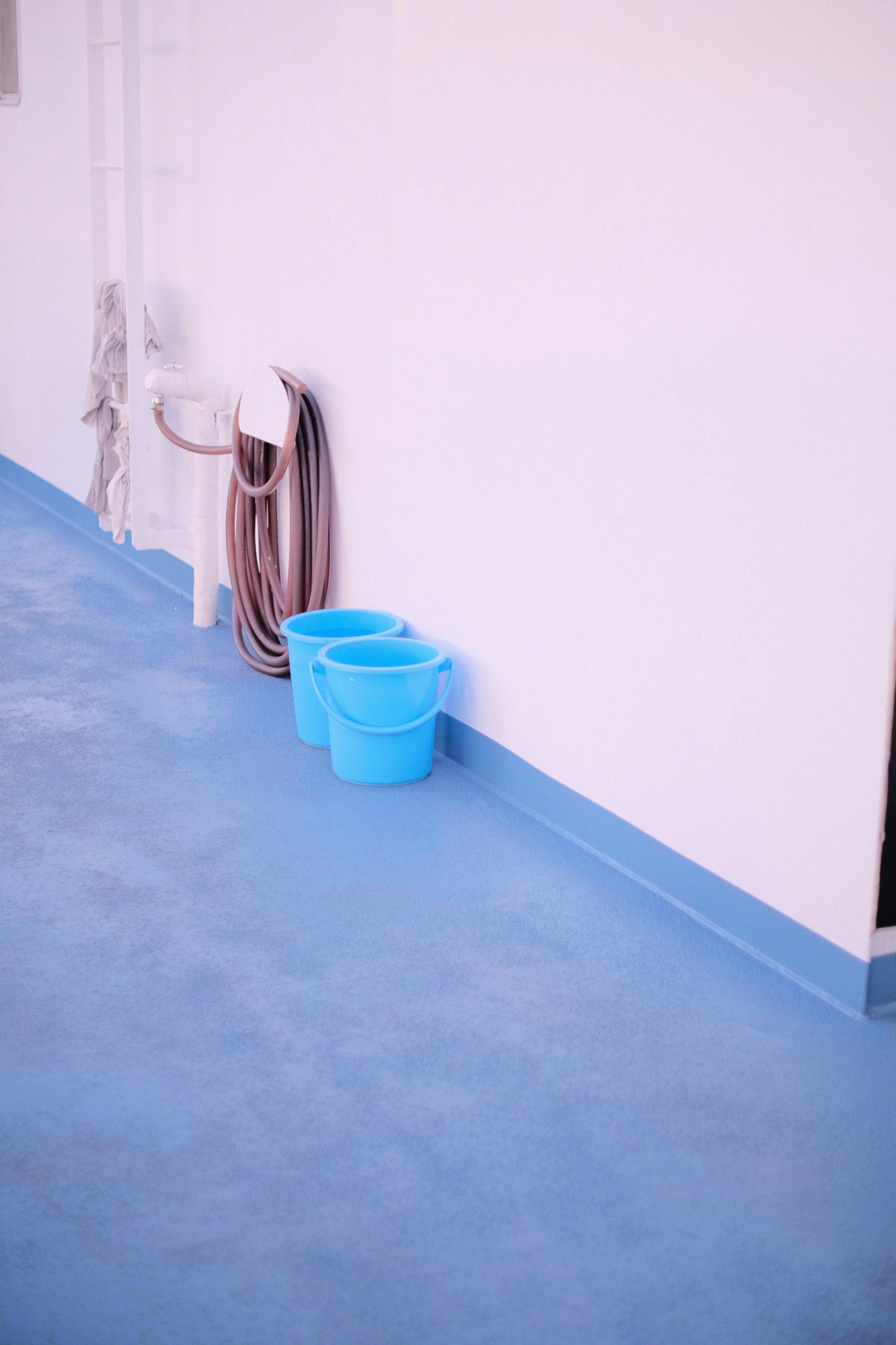Blue Pails and a Hose · Free Stock Photo