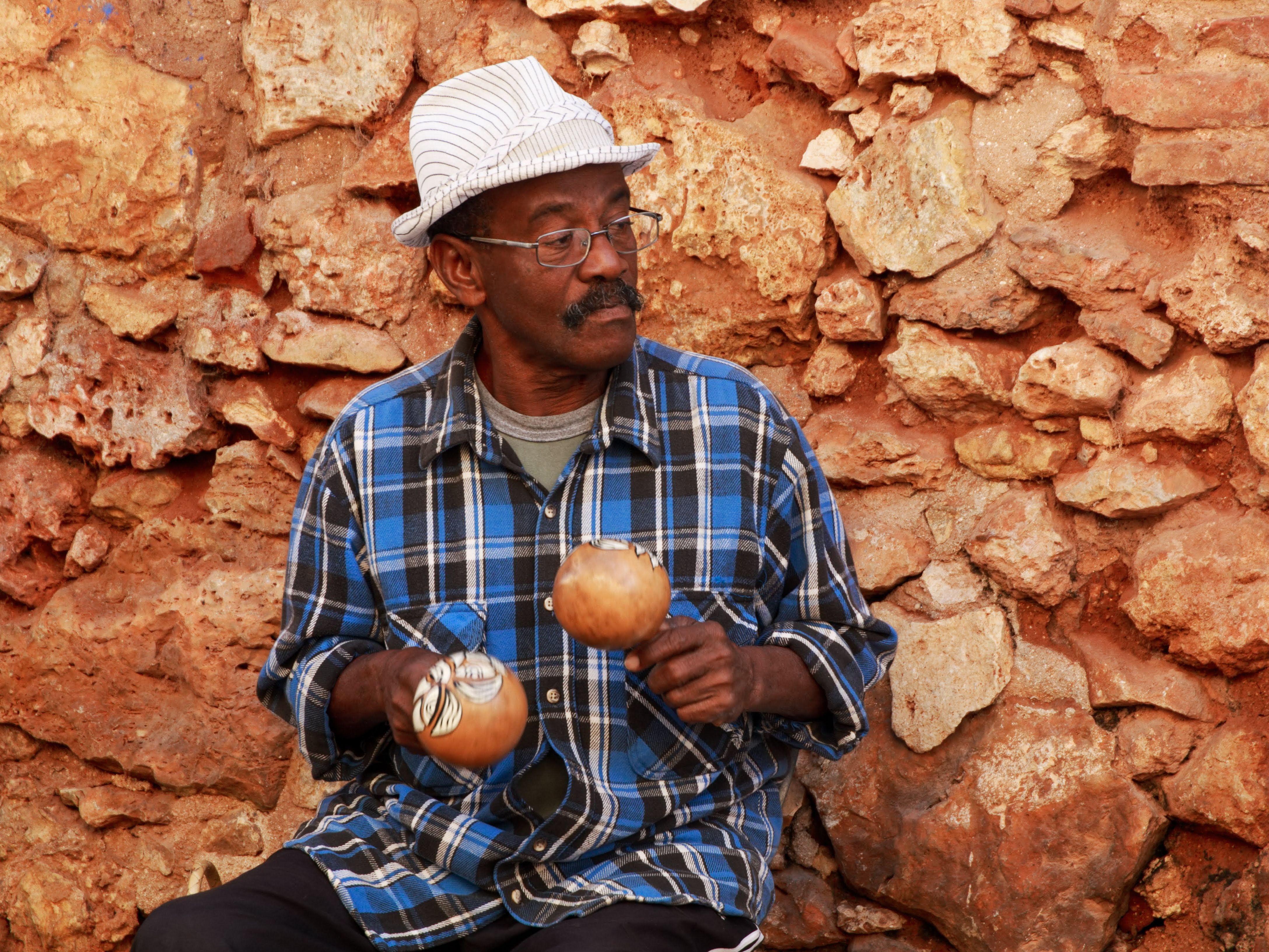 Man Playing Maraca on Towns Square · Free Stock Photo