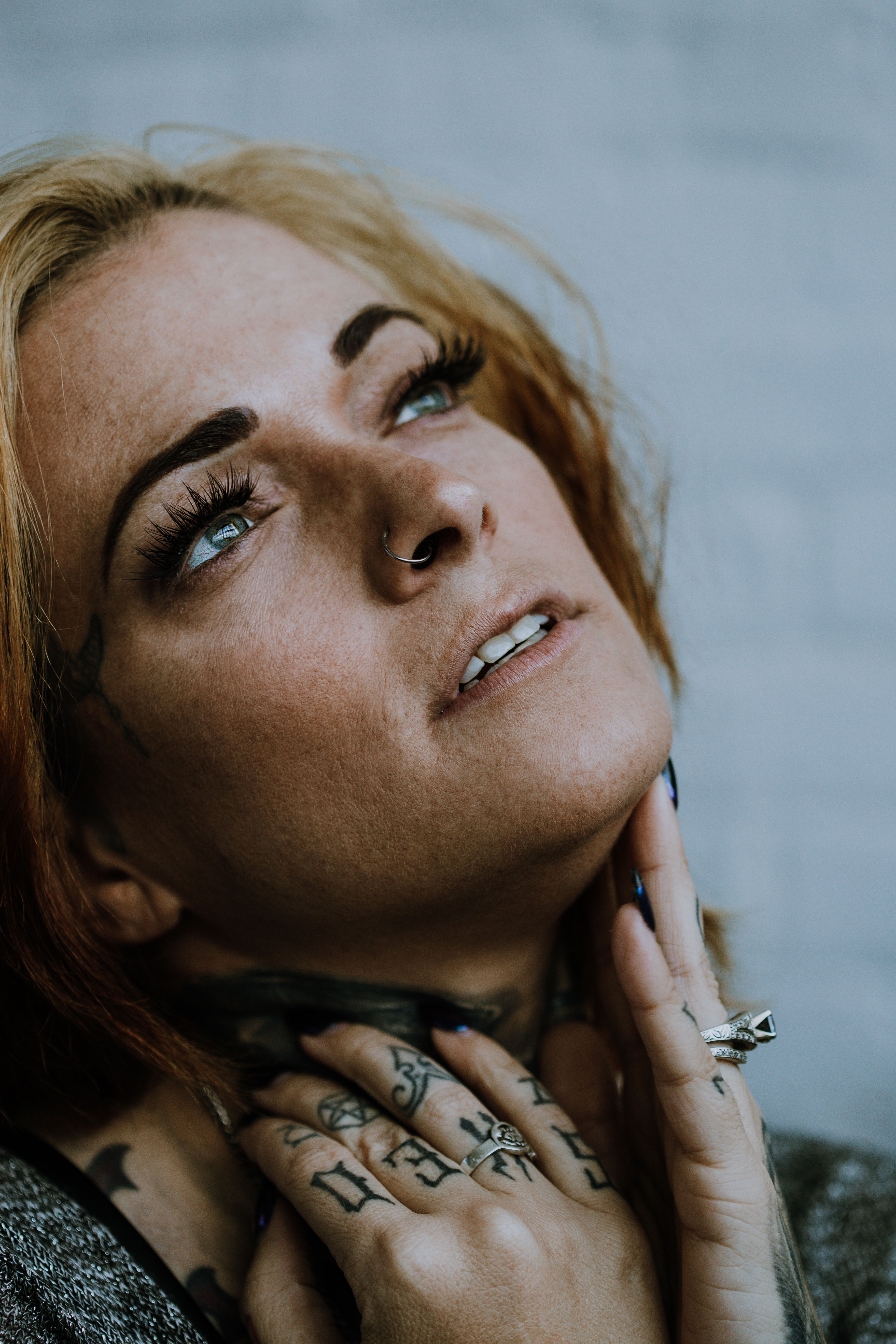 Model Posing with Hands around Neck · Free Stock Photo