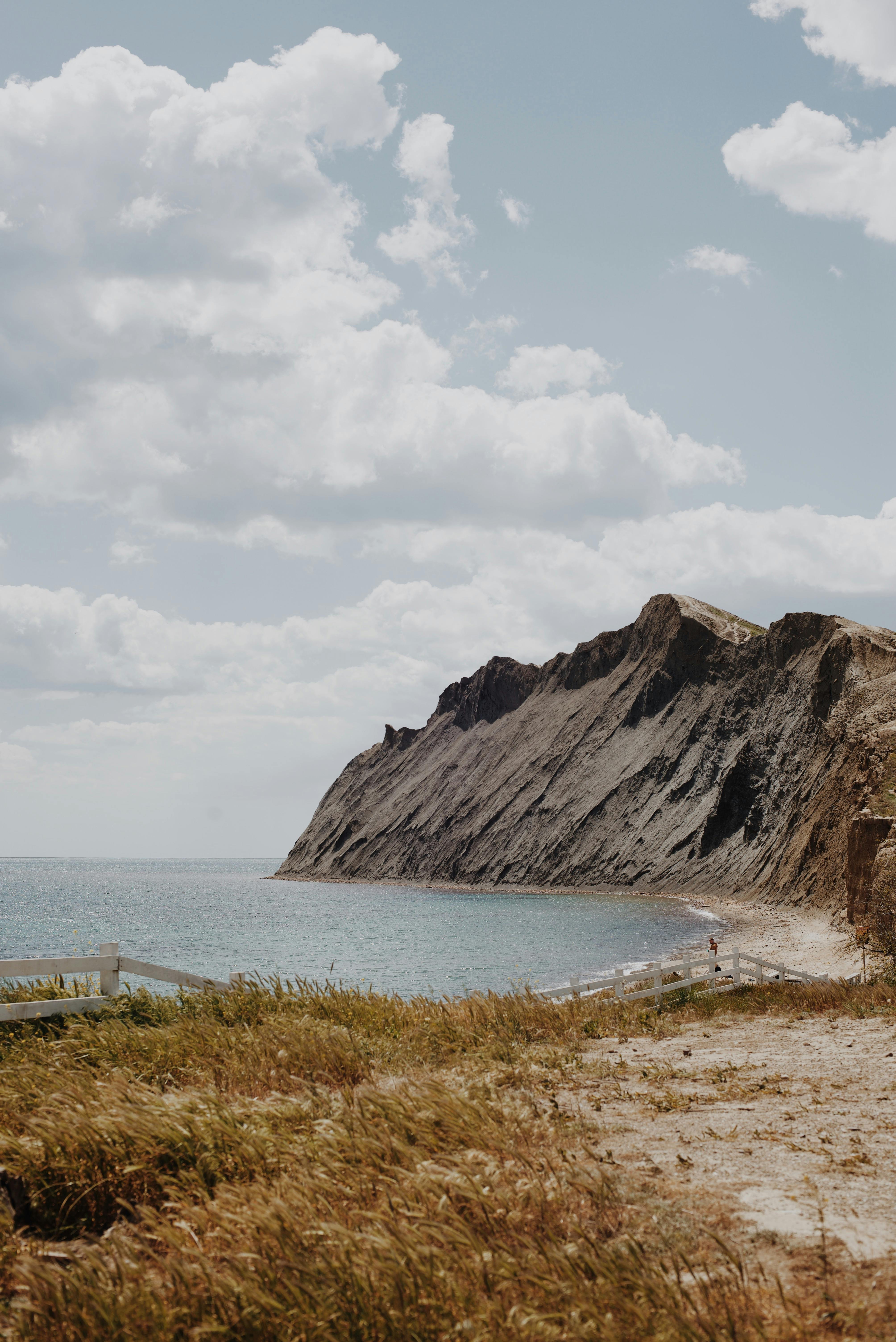 Cliff Rocks on Seashore · Free Stock Photo