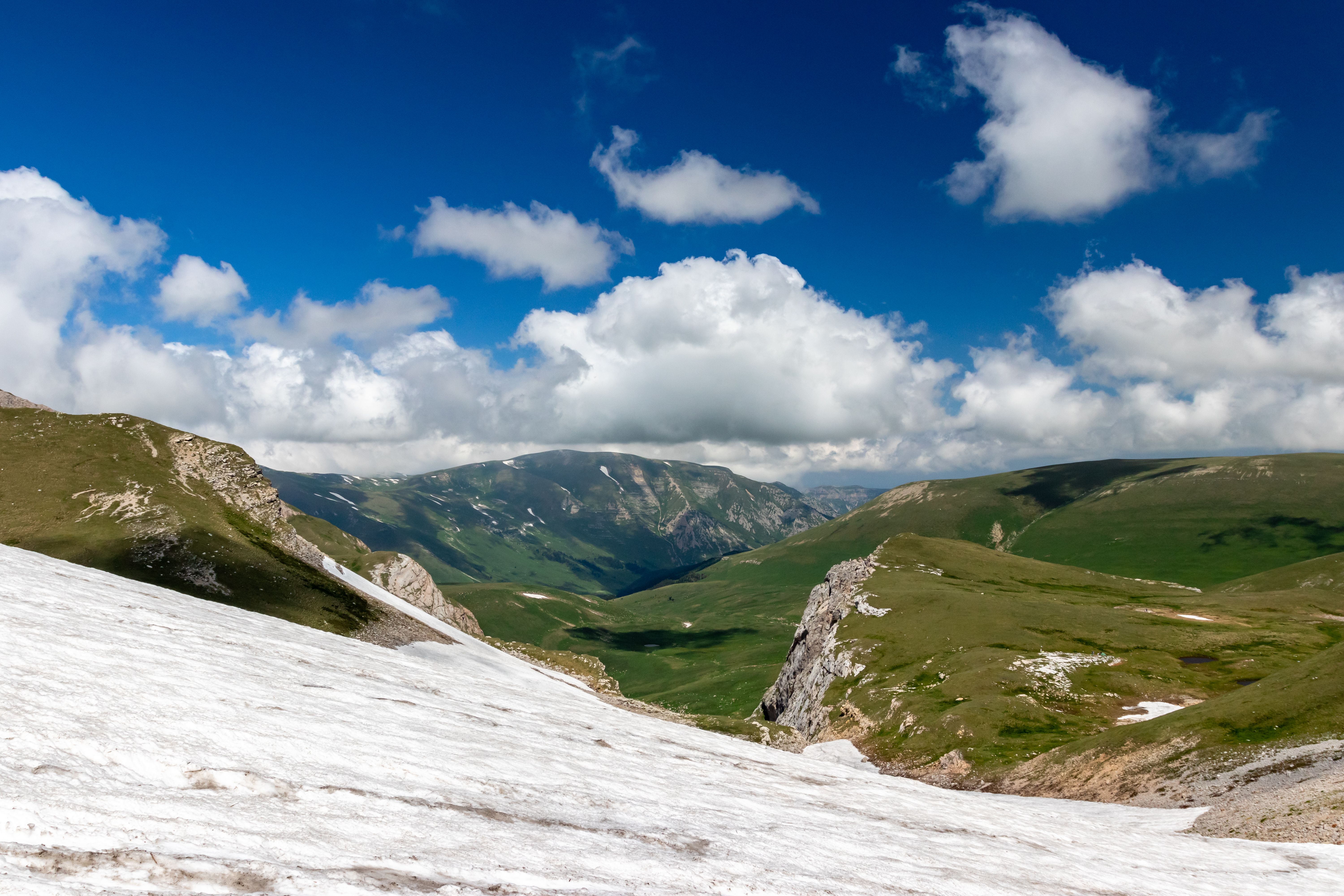 Clouds over Hills and Snow · Free Stock Photo