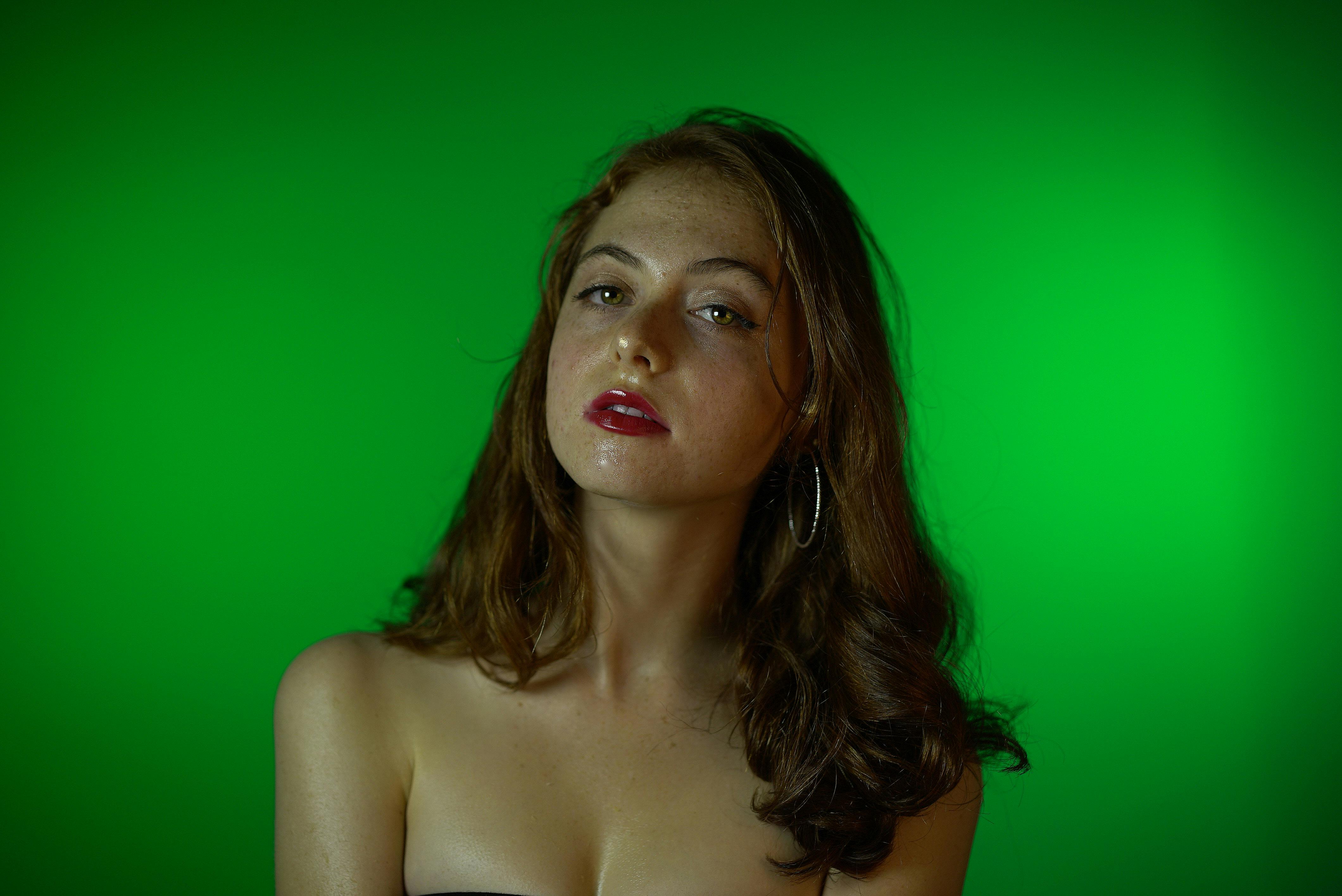 Shirtless Woman in Green Background · Free Stock Photo