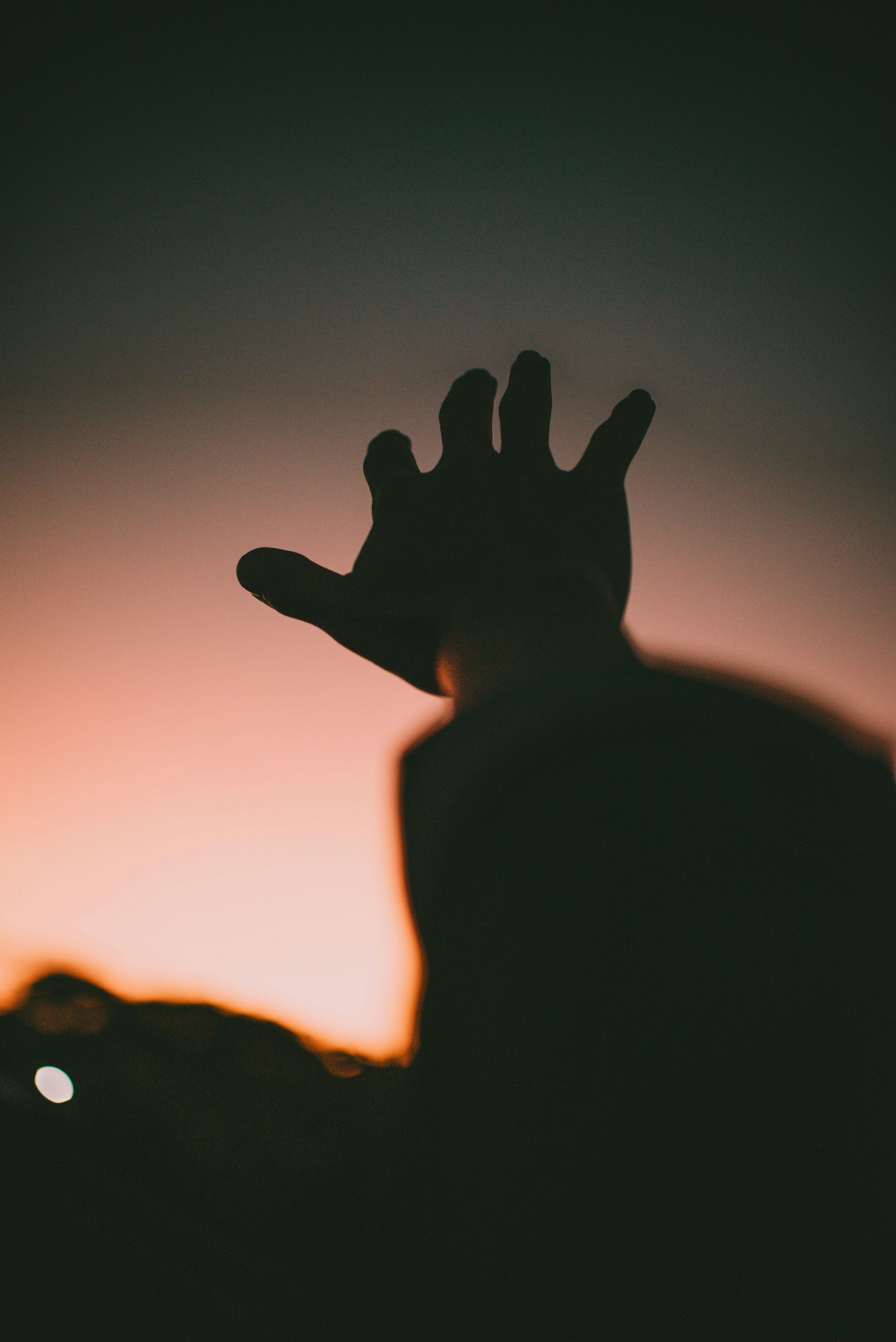 Dark Image with a Hand Silhouette · Free Stock Photo