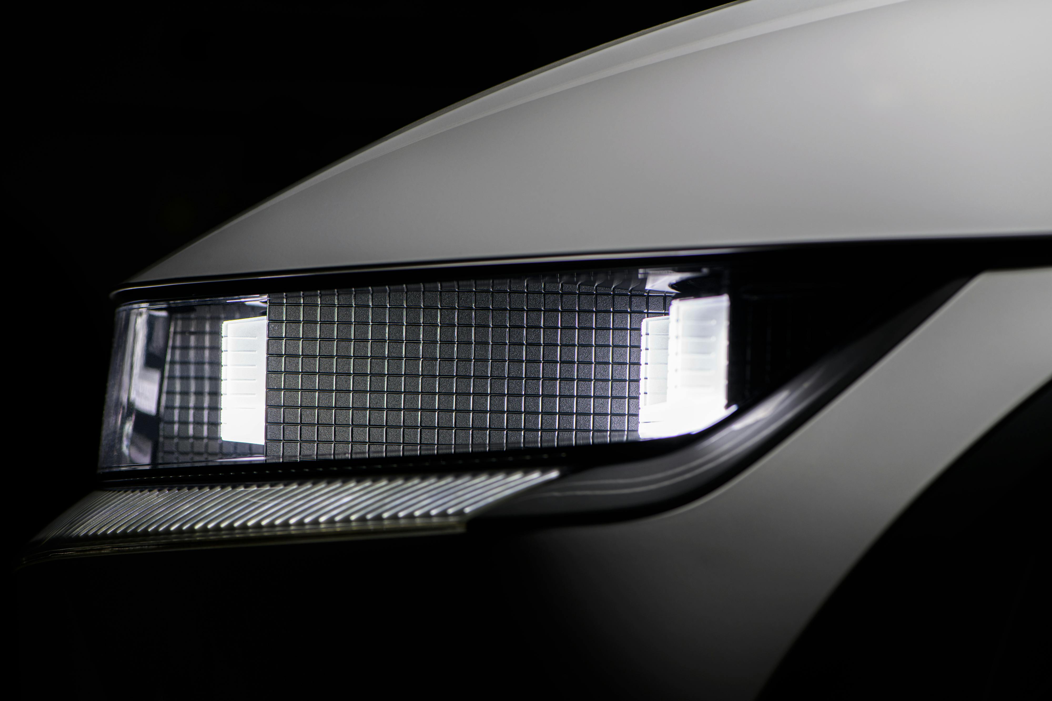 A Car's Headlight in Close-Up Photography · Free Stock Photo