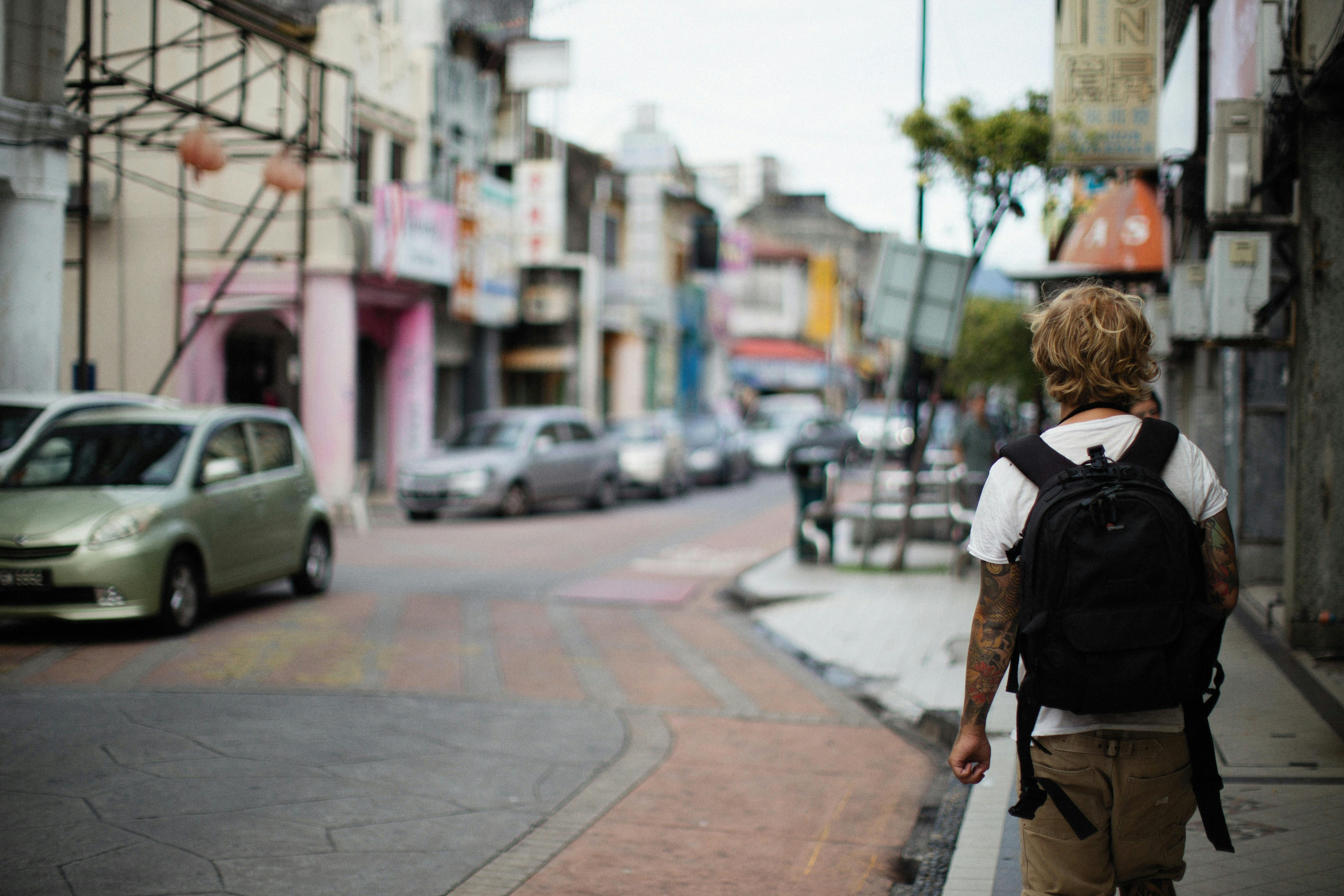 Man Carrying a Backpack · Free Stock Photo