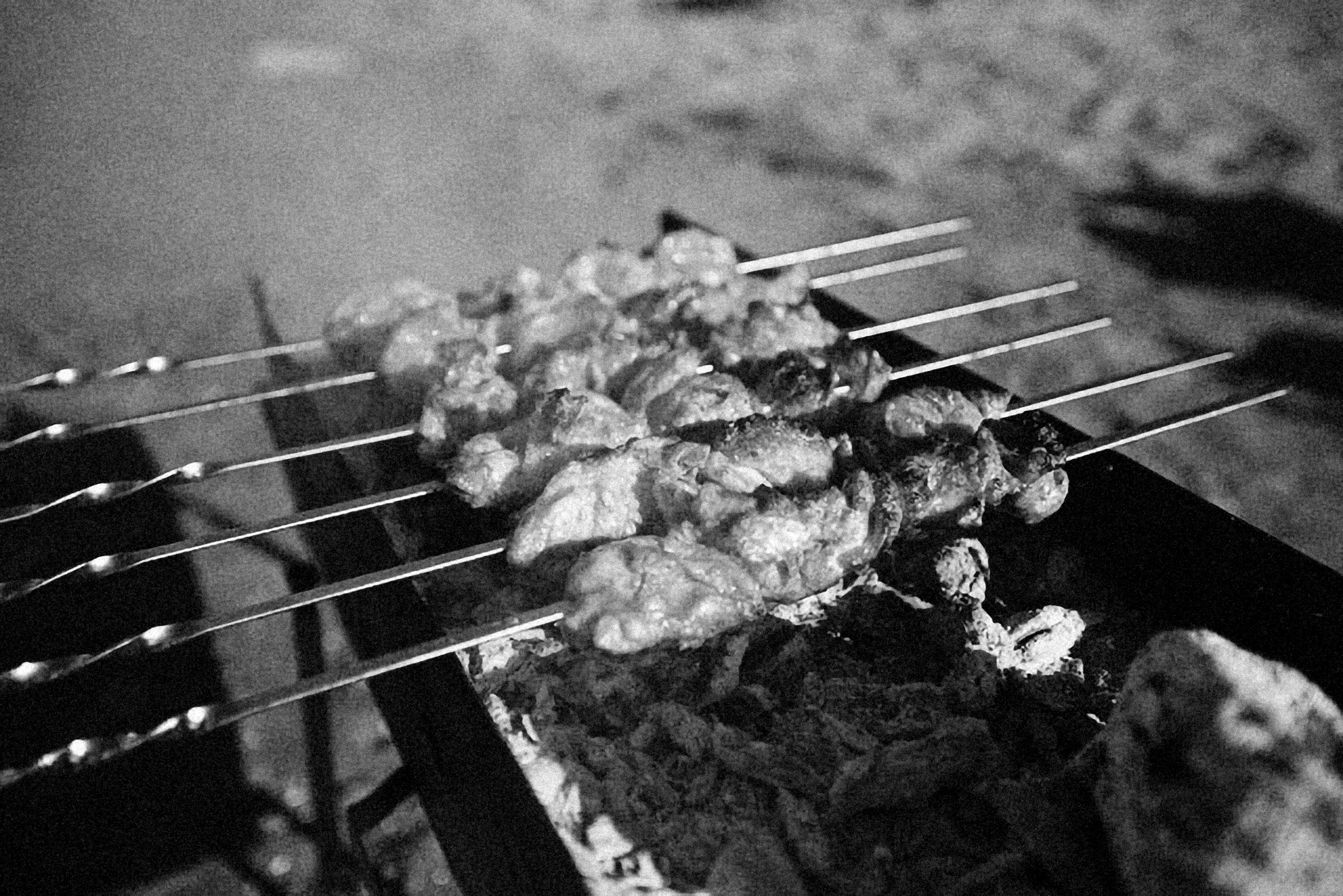 Grayscale Photo of Grilled Meat · Free Stock Photo