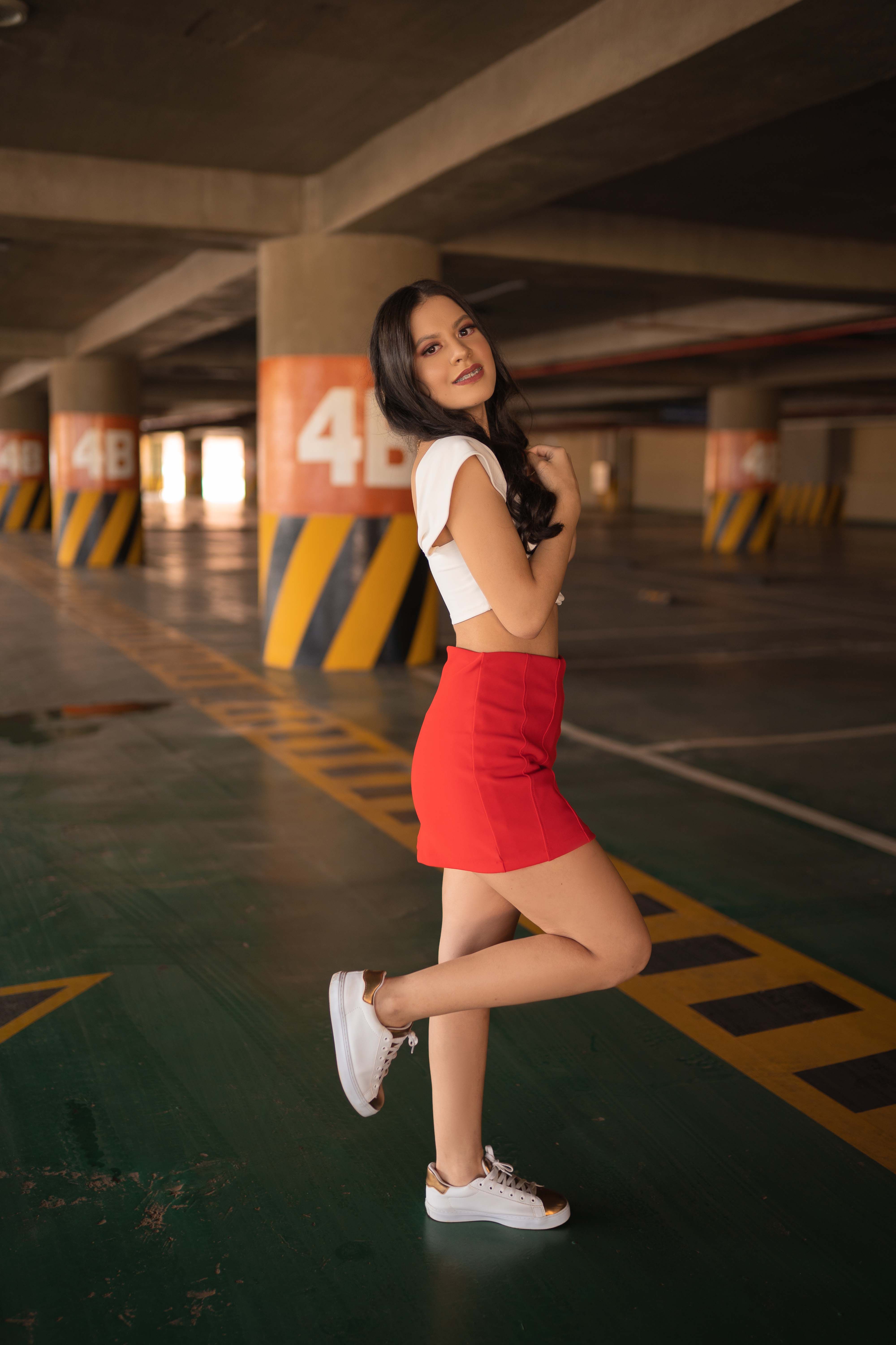 A Woman in White Top Posing · Free Stock Photo