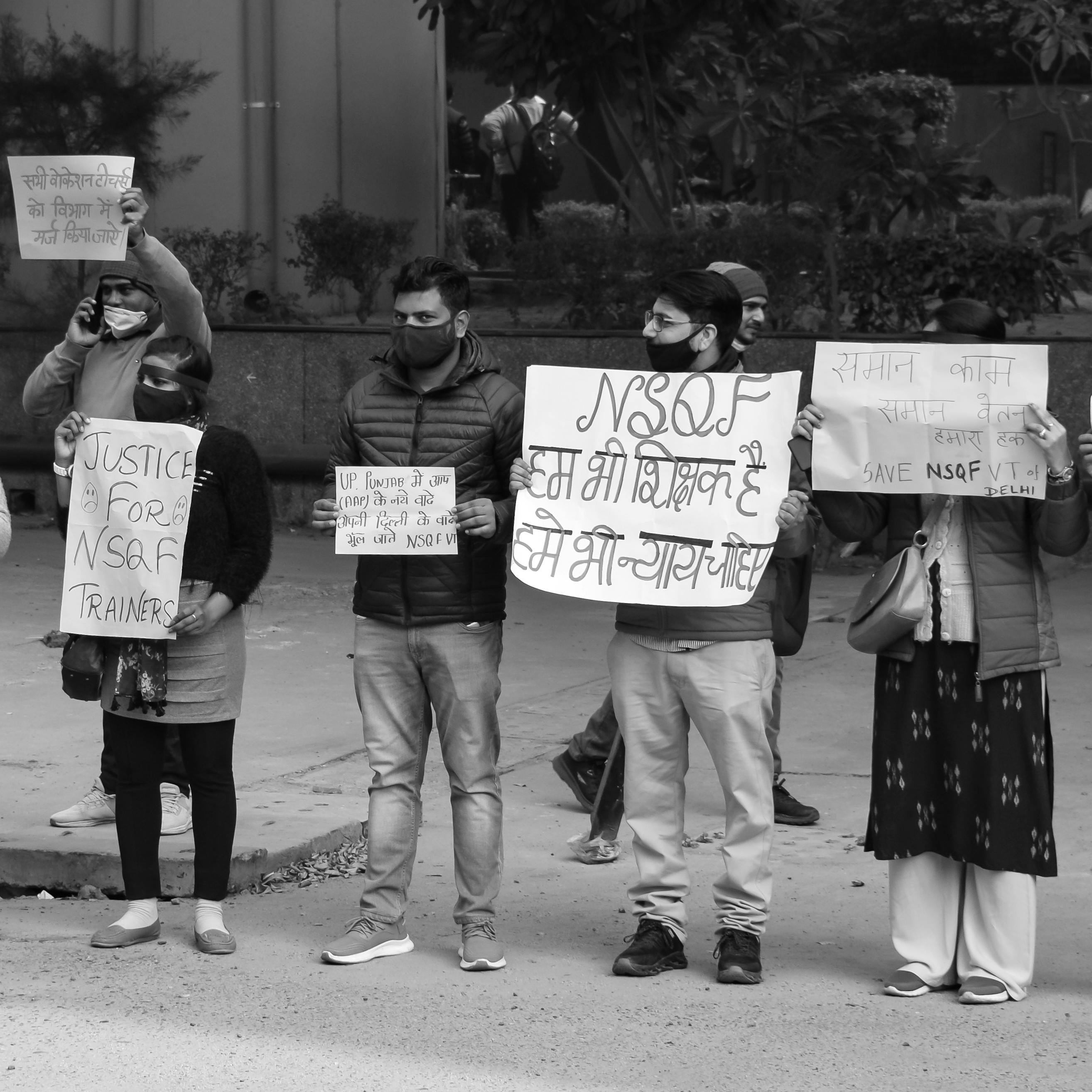 Grayscale Photo of People Protesting on the Street · Free Stock Photo