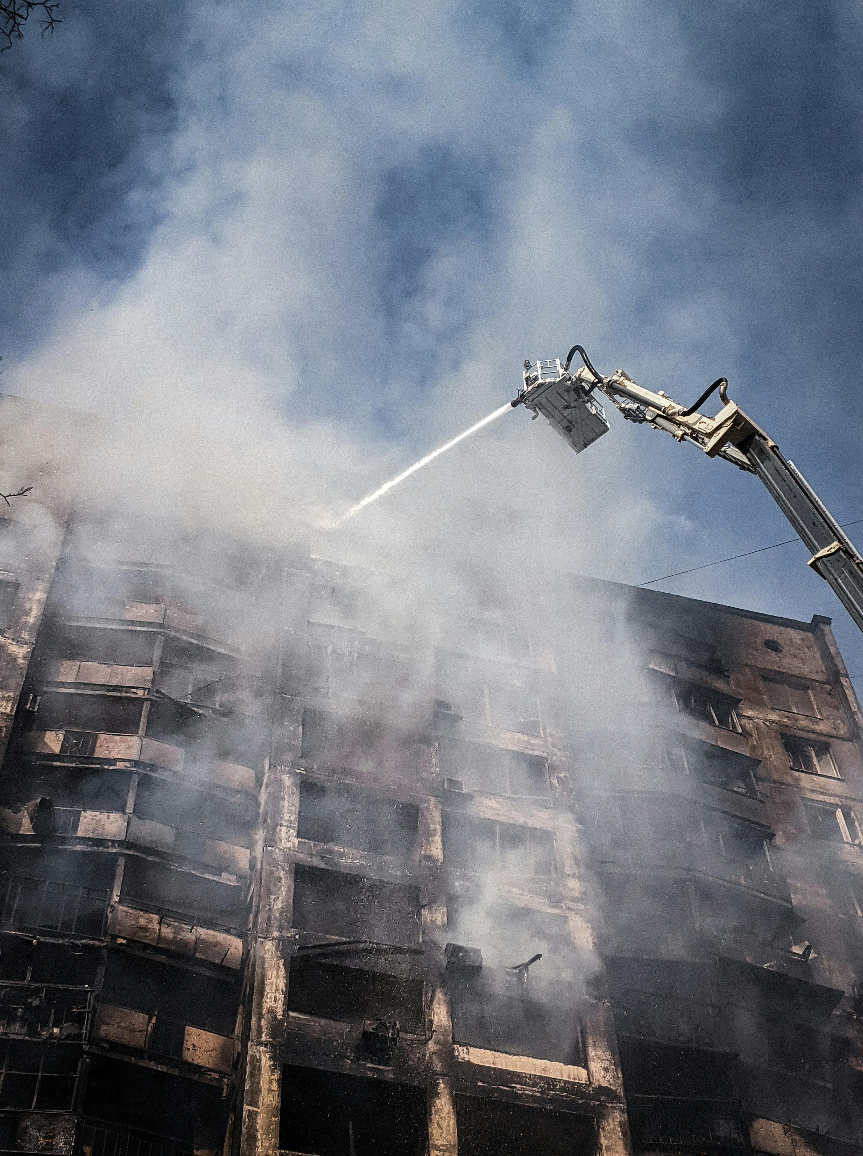 Extinguishing Fire of Skyscraper Residential Building · Free Stock Photo