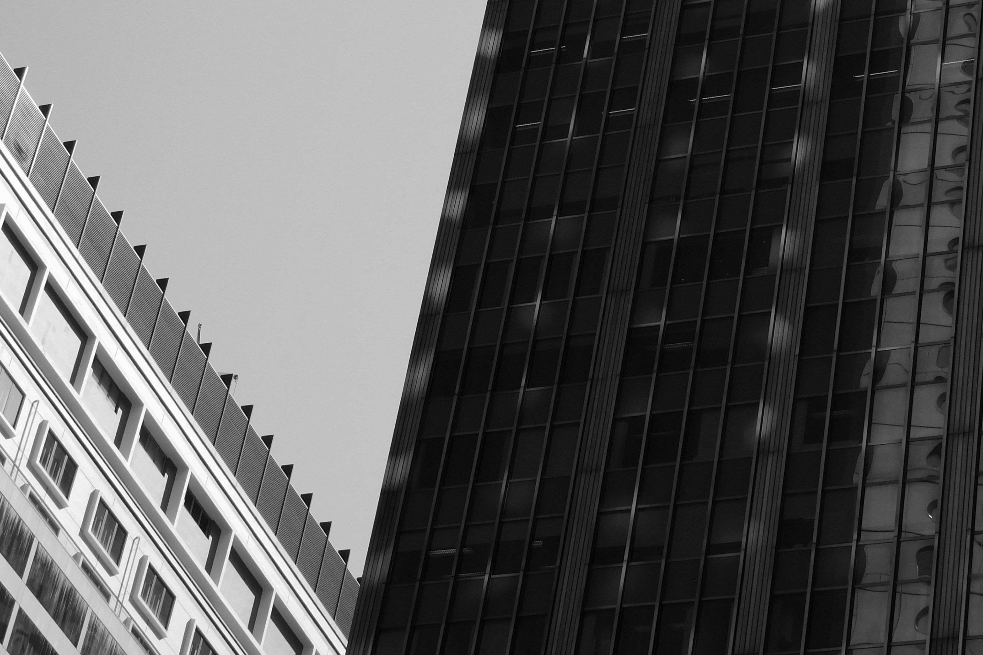 Grayscale Photo Of An Open Window Covered With Paper · Free Stock Photo